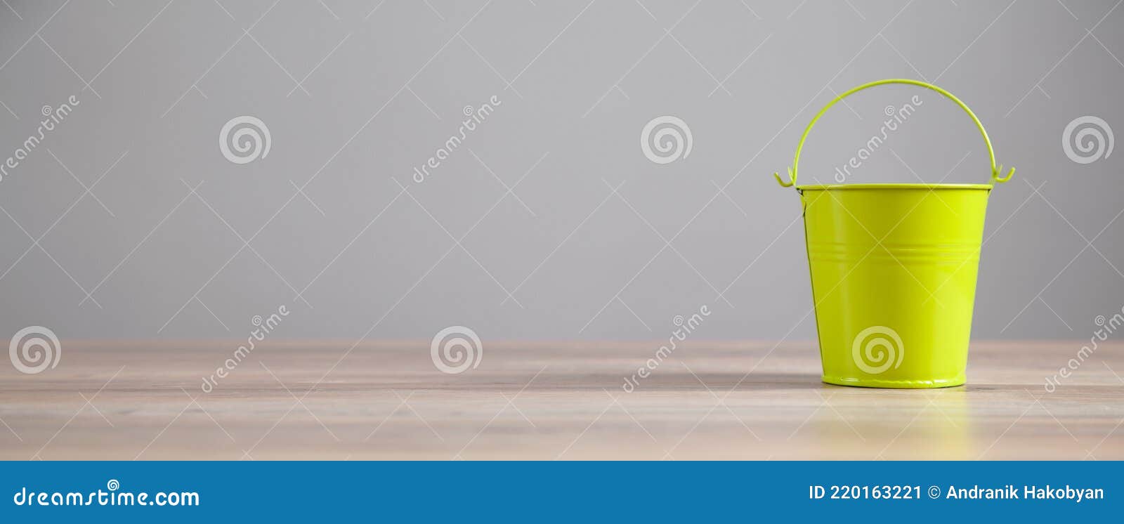 Green Bucket on the Desk. Space for Your Text Stock Image - Image of ...