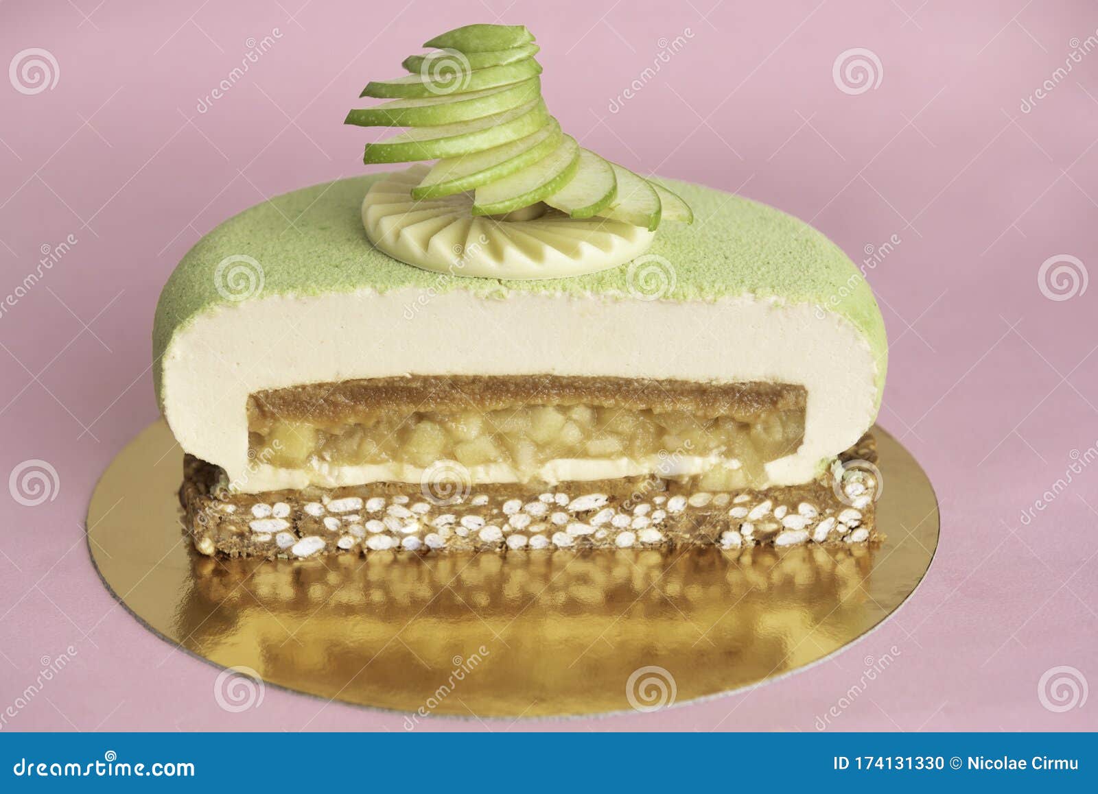 Green Cake on Crunchy Layer in Section, with Apple Slices Stock Photo ...