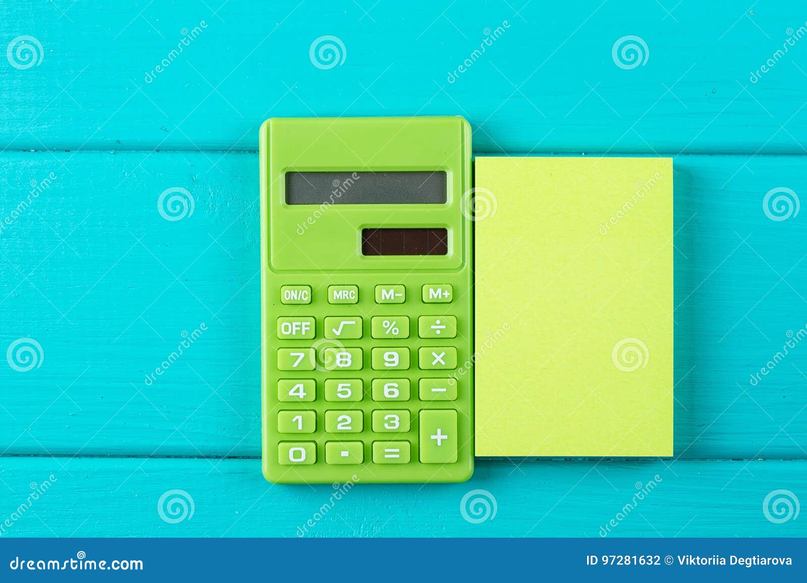Green Calculator with a Paper Sticker Stock Photo - Image of closeup ...