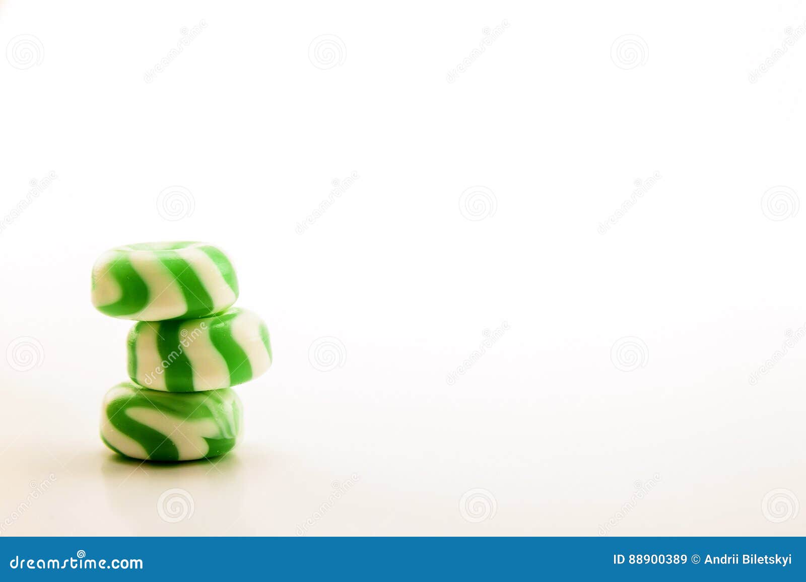 Green Candies with Stripes on White Background Stock Image - Image of ...