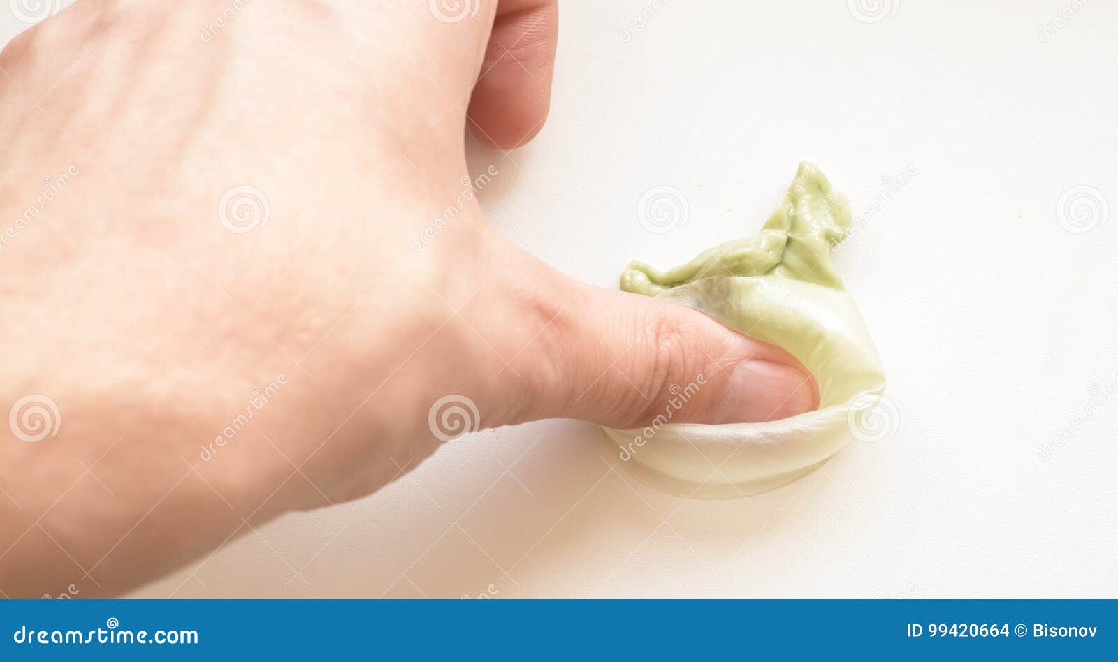 Green Chewing Gum and Man Hand Push it Stock Photo - Image of hand ...