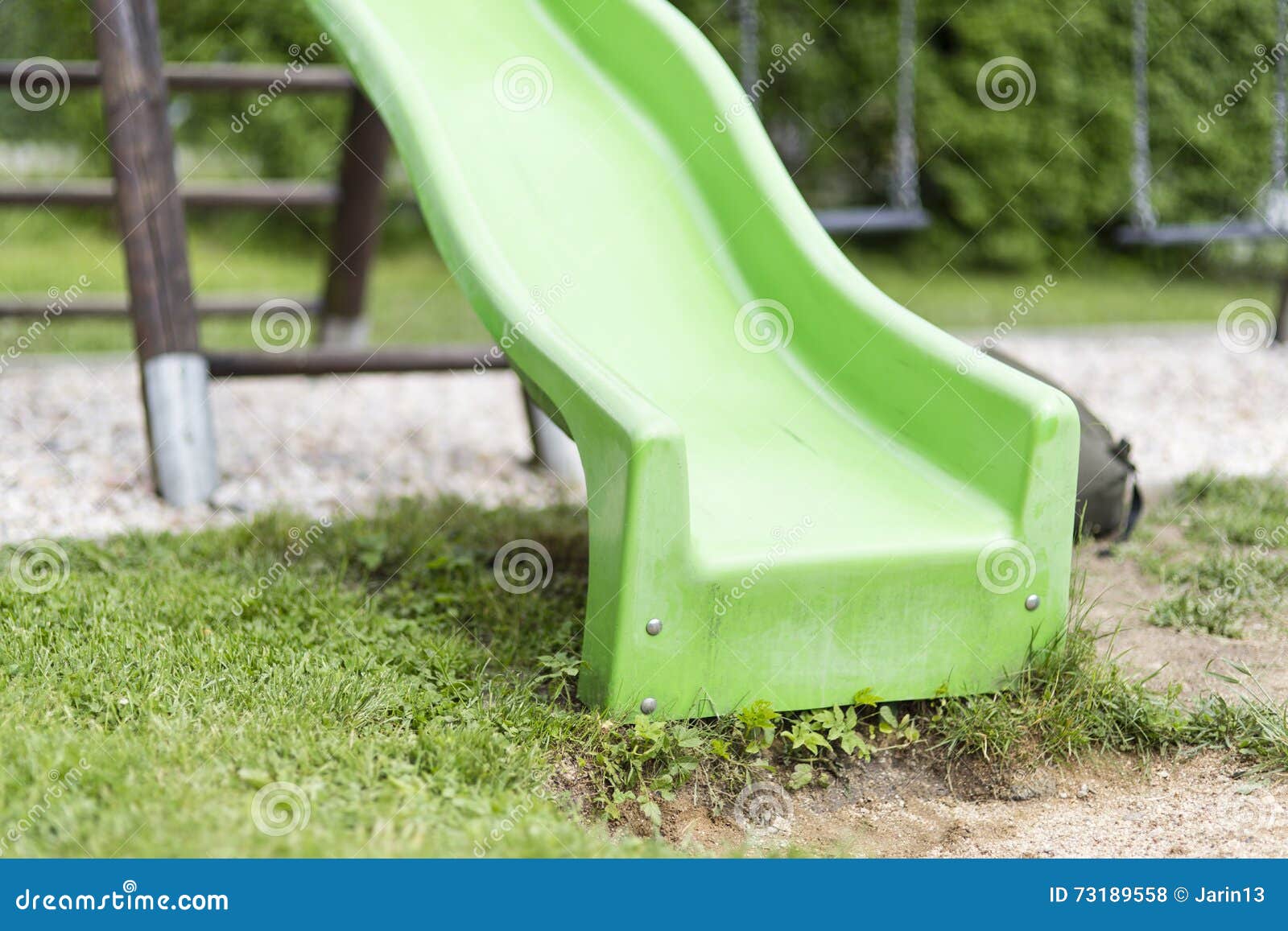 Green Child Slide on Playground Stock Photo - Image of play, leisure ...