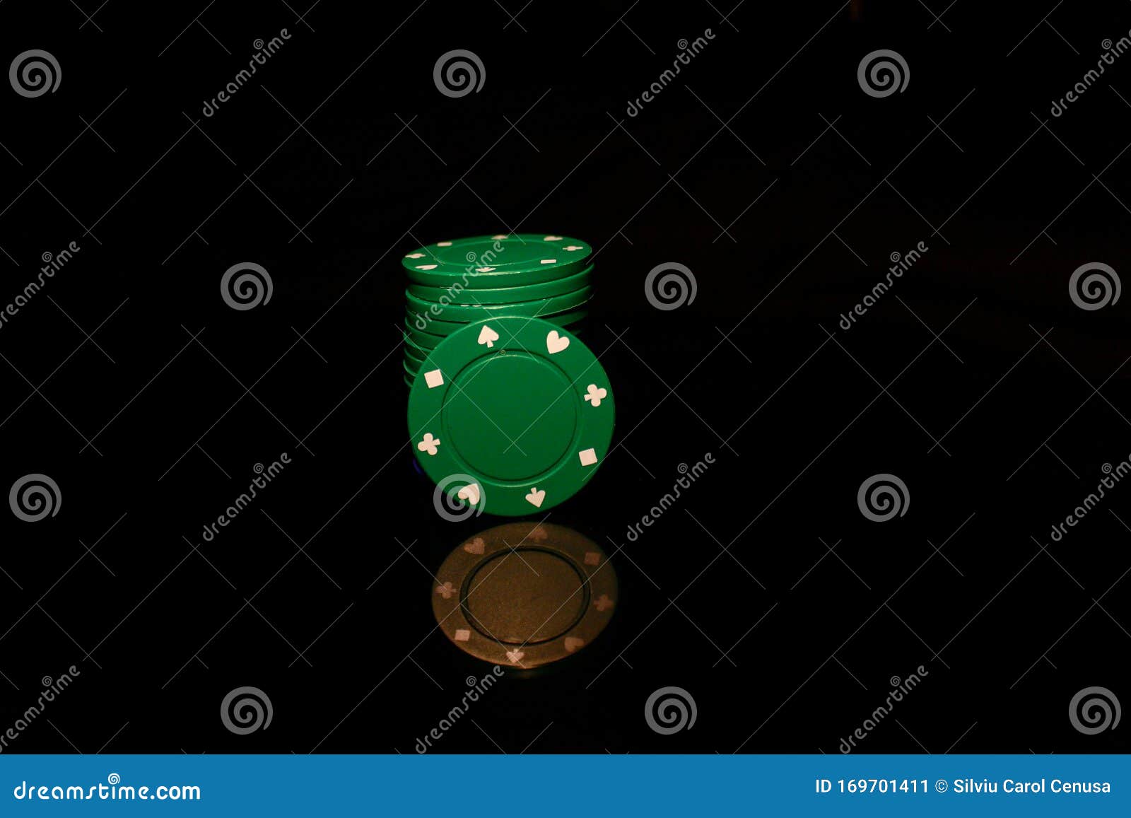 Green Chips Stack with a Green Chip in Front Isolated on Black with ...