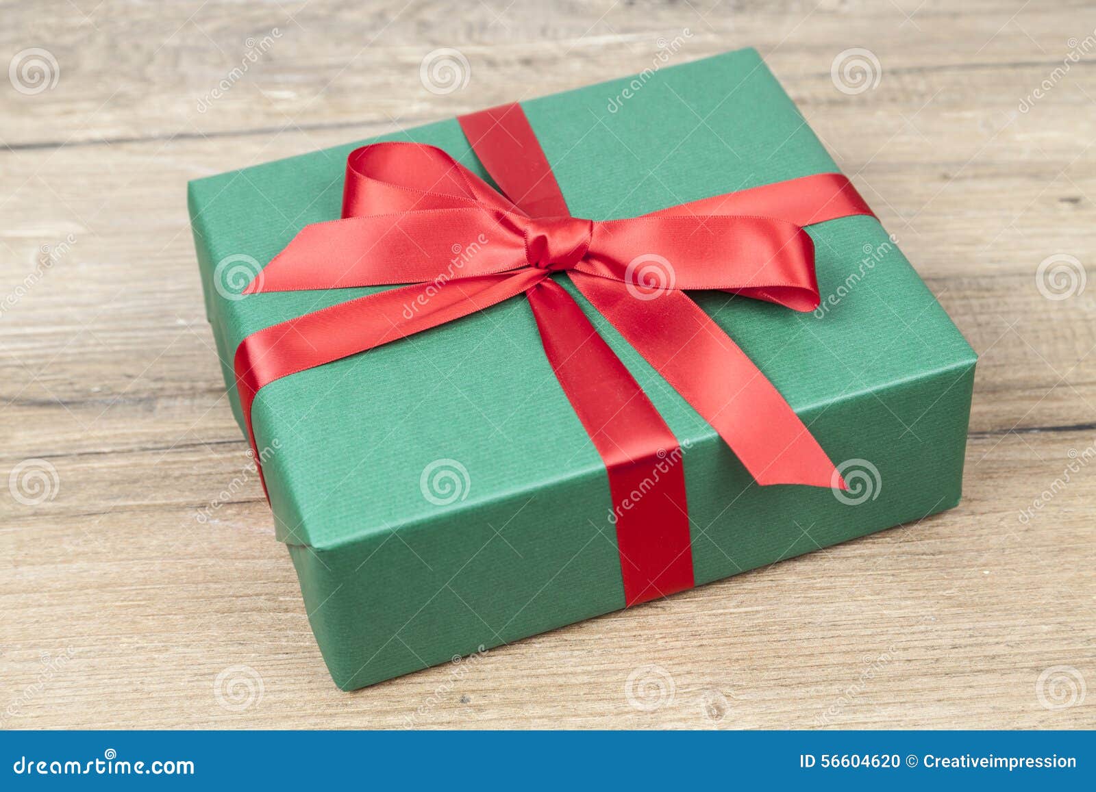 Green Christmas present stock photo. Image of ribbon - 56604620