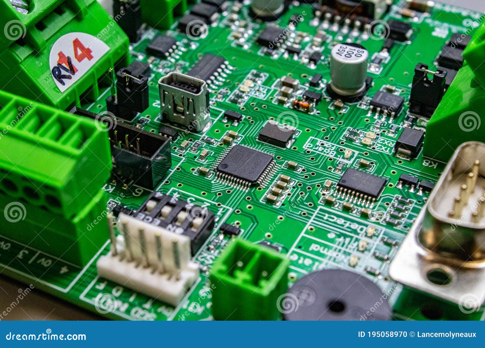 Green Circuitboard With Microcontroller And Lots Of Connectors Stock ...