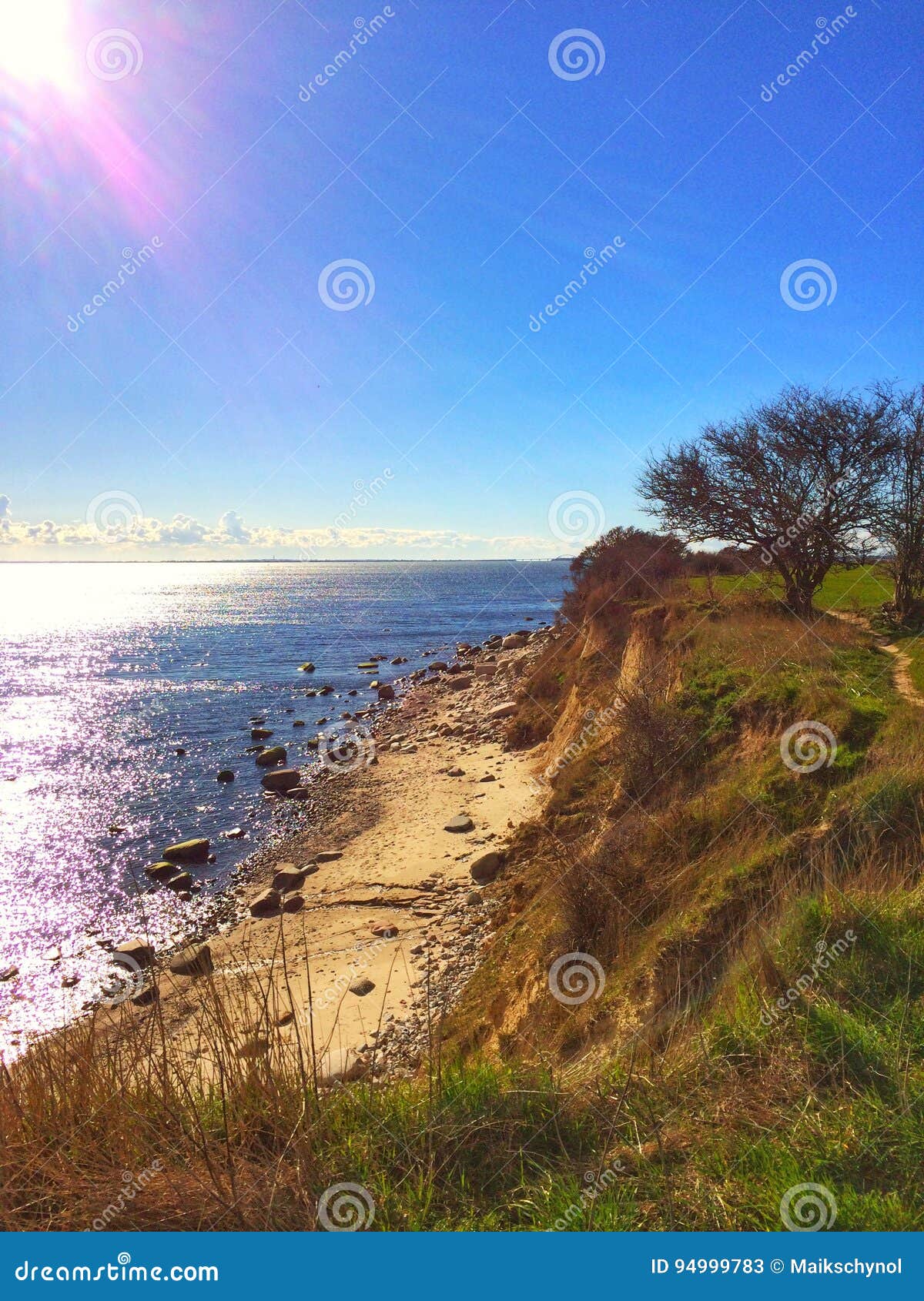 Green Coastline and Blue Sky Stock Image - Image of outdoors, rocks ...
