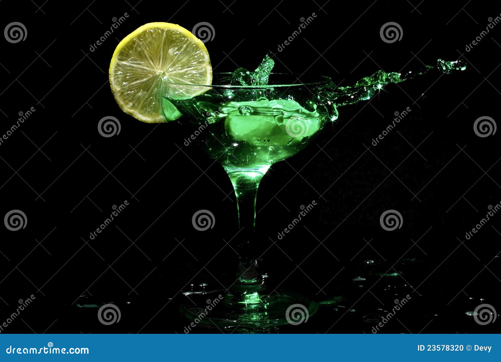 Green Cocktail Splashing in a Glass Stock Photo - Image of liquid ...