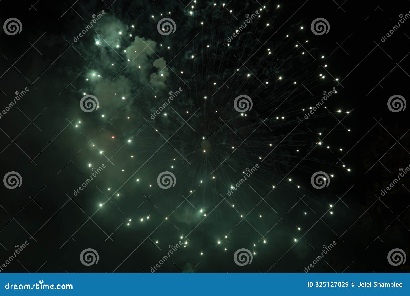 Exploding green firework. stock image. Image of green - 325127029