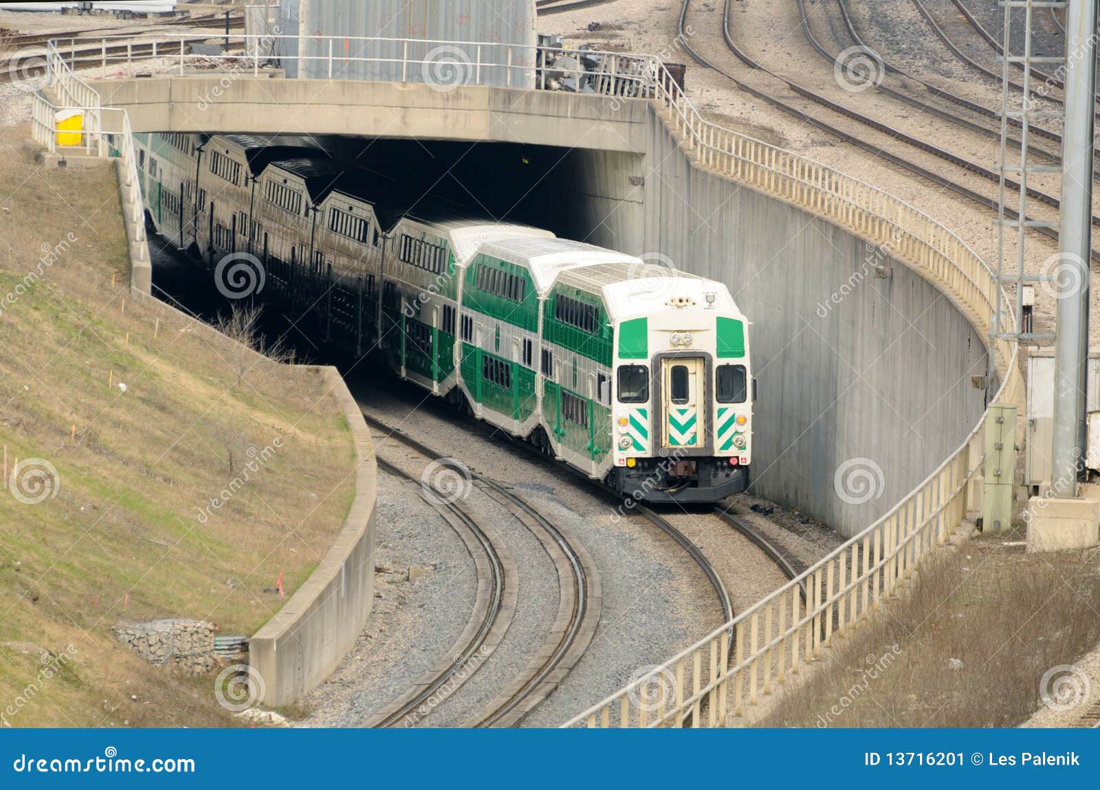 Green commuter train stock image. Image of bridge, carriage - 13716201