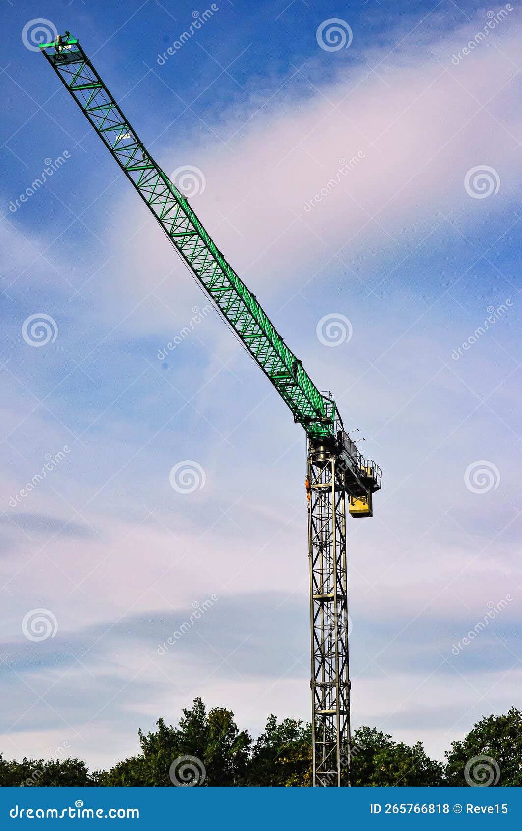Green construction crane stock photo. Image of front - 265766818