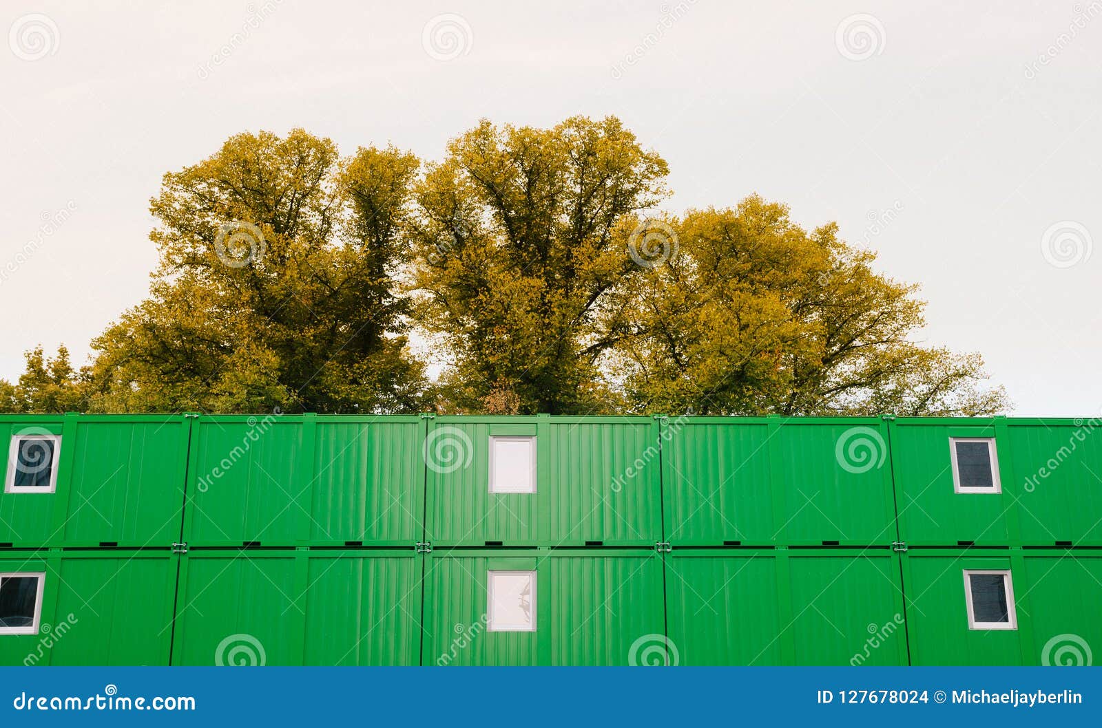 Green Containers and Trees in Background Stock Photo - Image of city ...