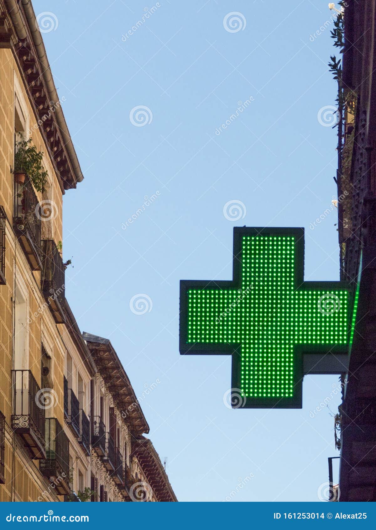 Green cross in a building stock photo. Image of health - 161253014