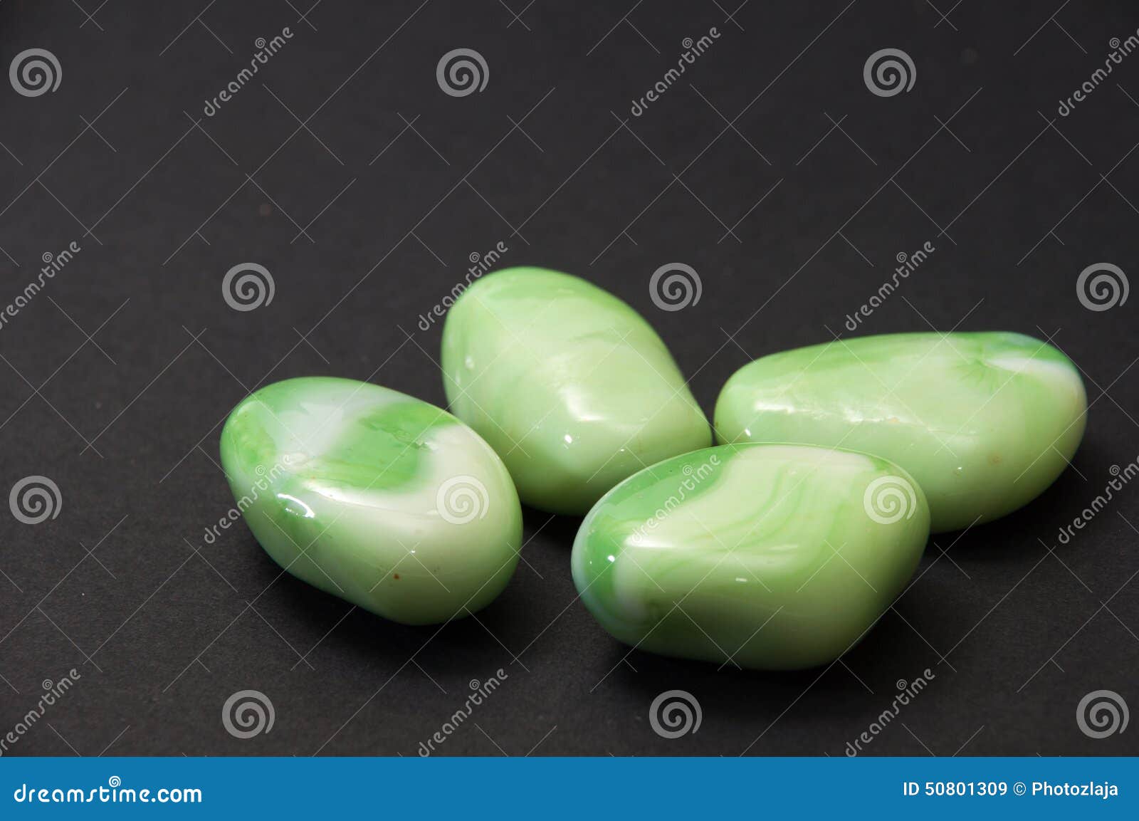 Green Decorative Stones on a Black Background Stock Image - Image of ...