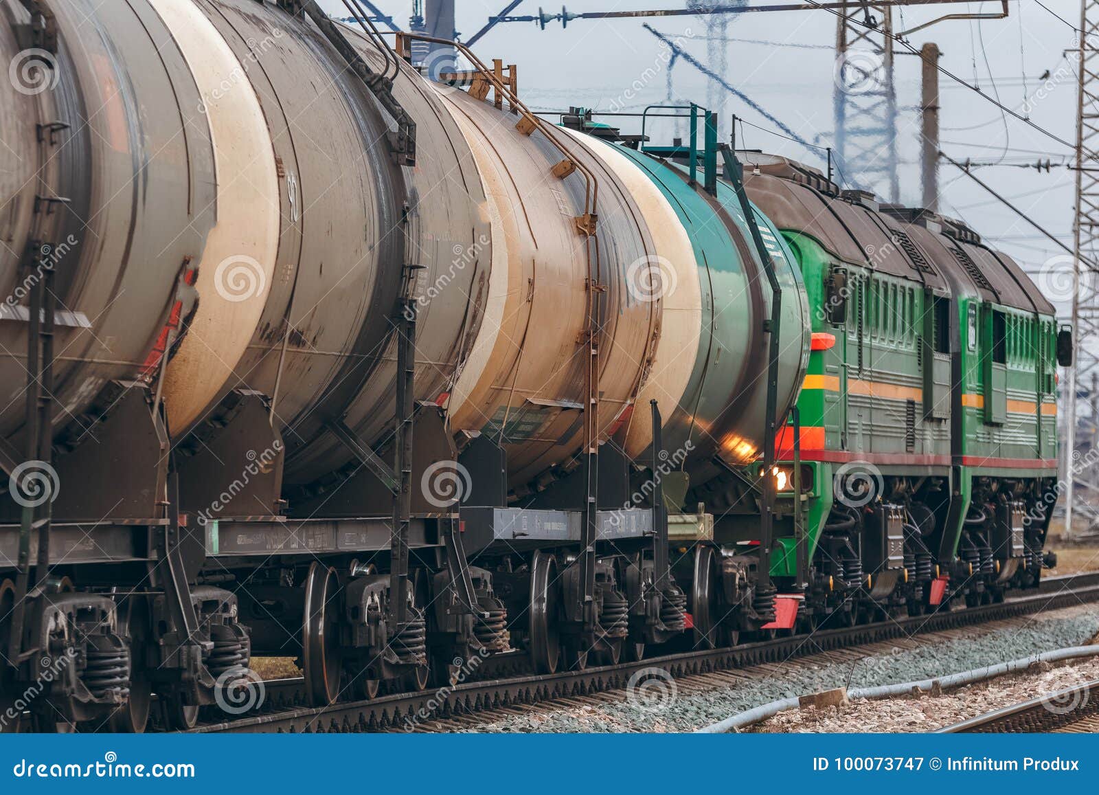 Green diesel locomotive stock image. Image of cargo - 100073747