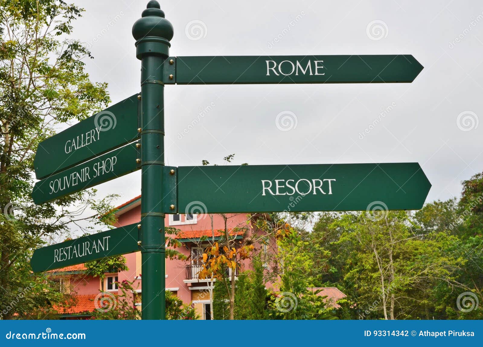 Green Direction Sign and Pole in Resort Stock Photo - Image of ...