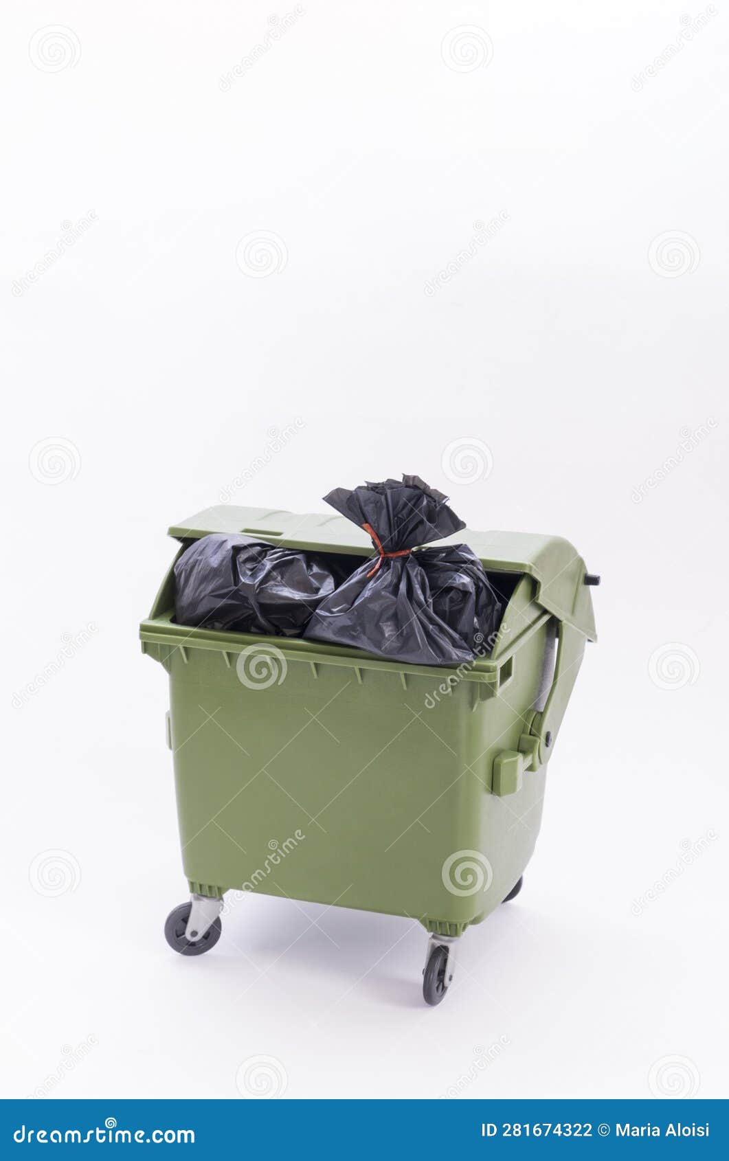 A green dust bin full. stock photo. Image of container - 281674322