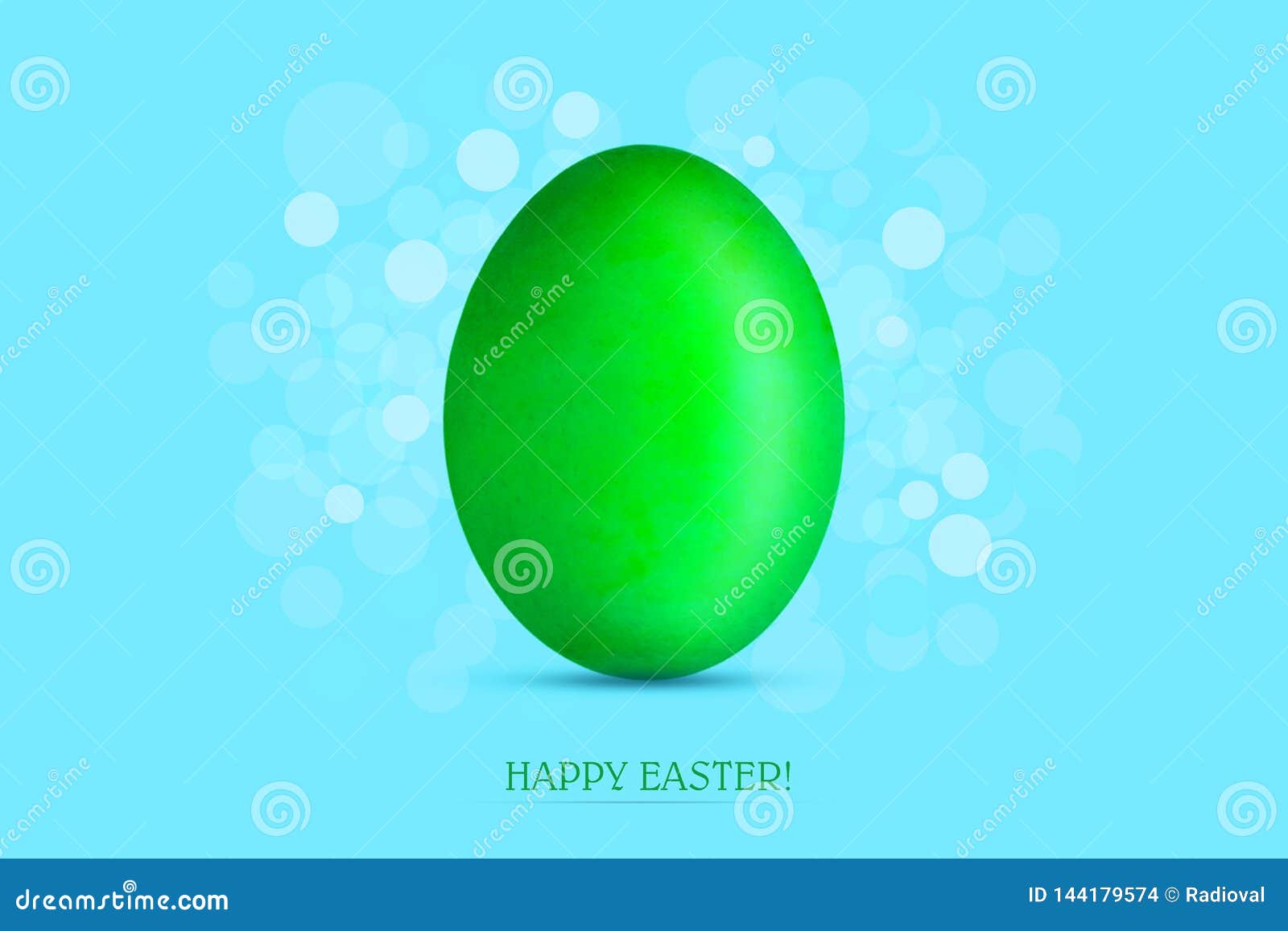 Green Easter Egg on a Blue Background. Easter Background Stock Photo ...