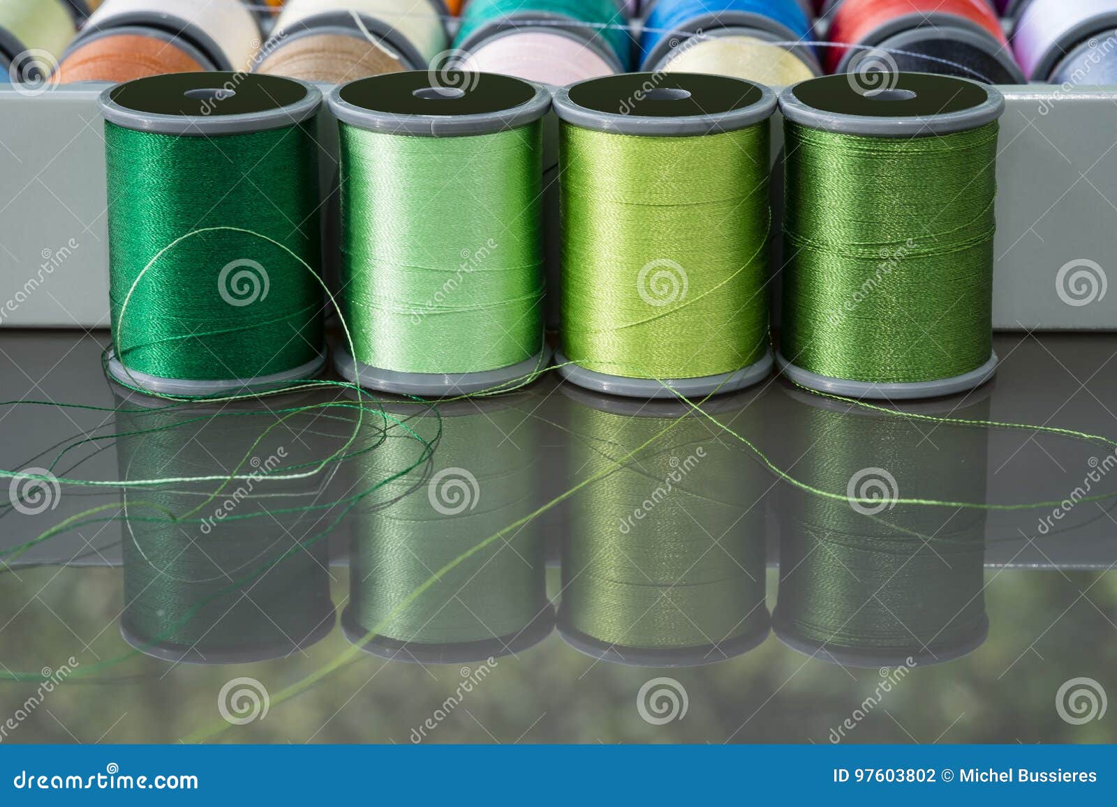 Green Embroidery Thread Reels Stock Photo - Image of white, place: 97603802