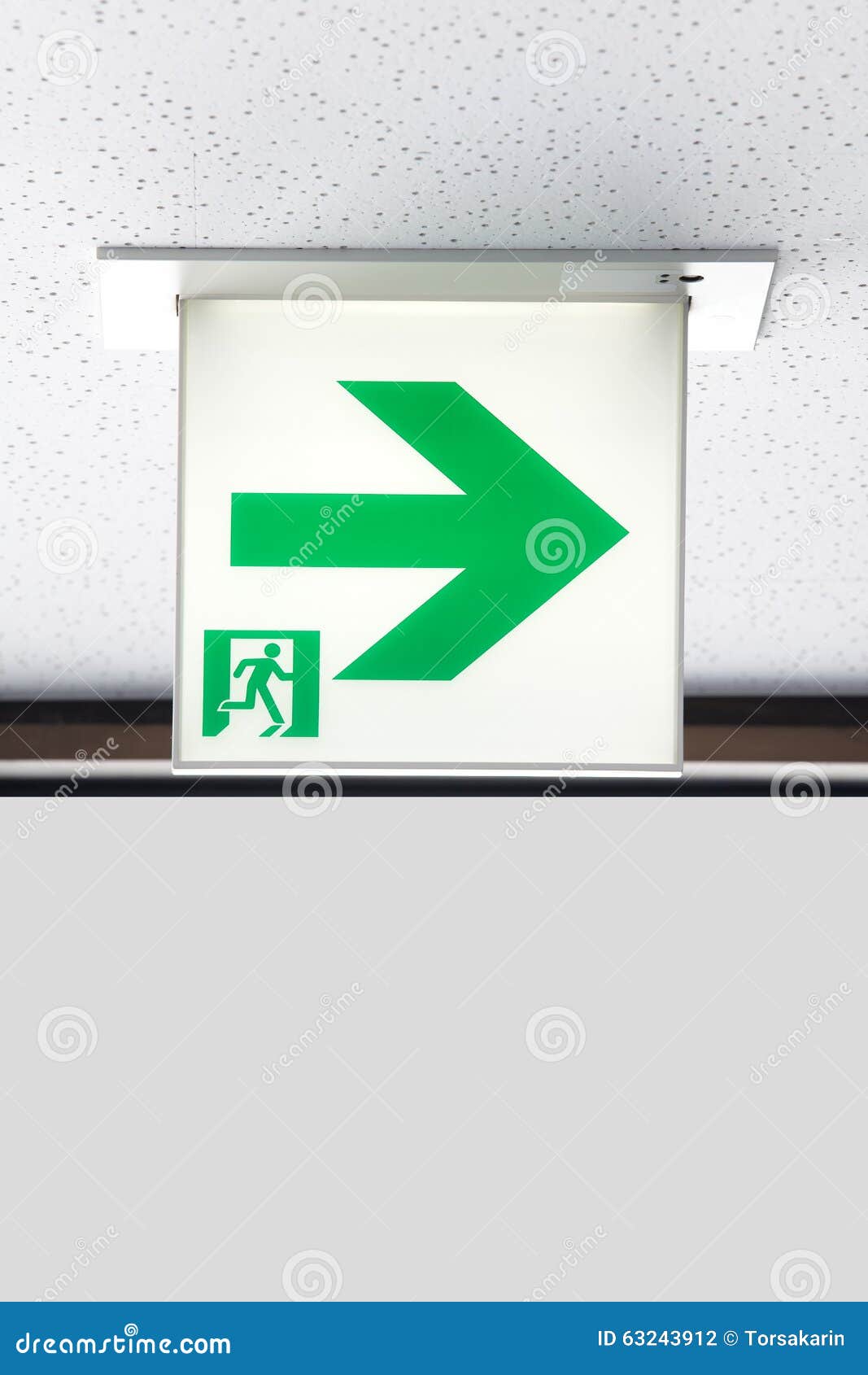 Green emergency exit sign stock photo. Image of close - 63243912
