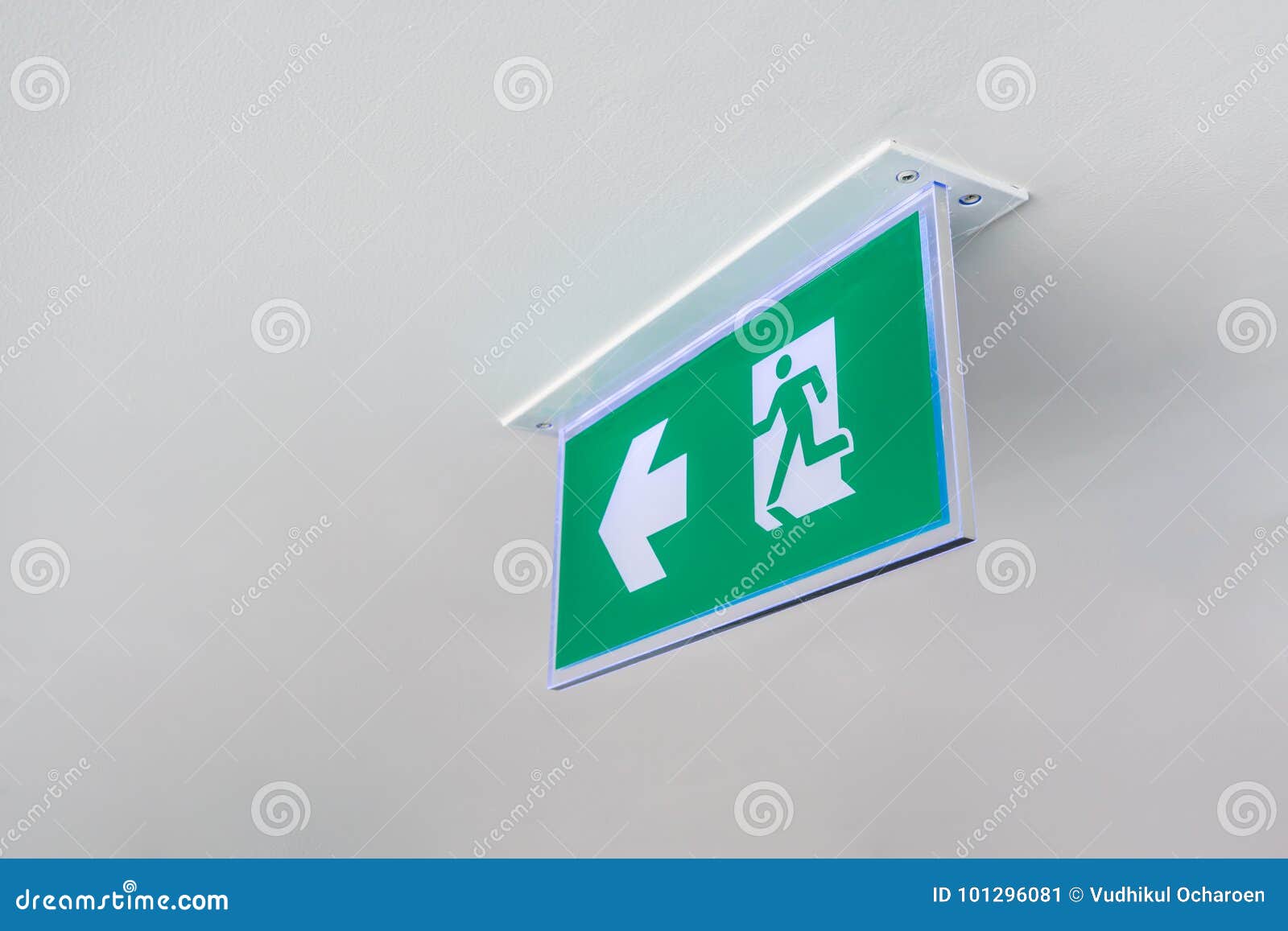 Green emergency exit sign. stock image. Image of hanging - 101296081