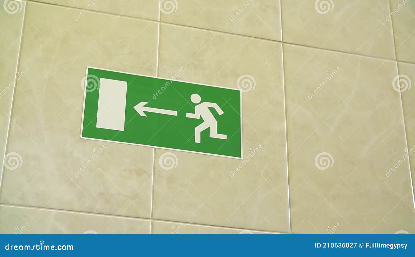 Green Emergency Exit Sign stock video. Video of floor - 210636027