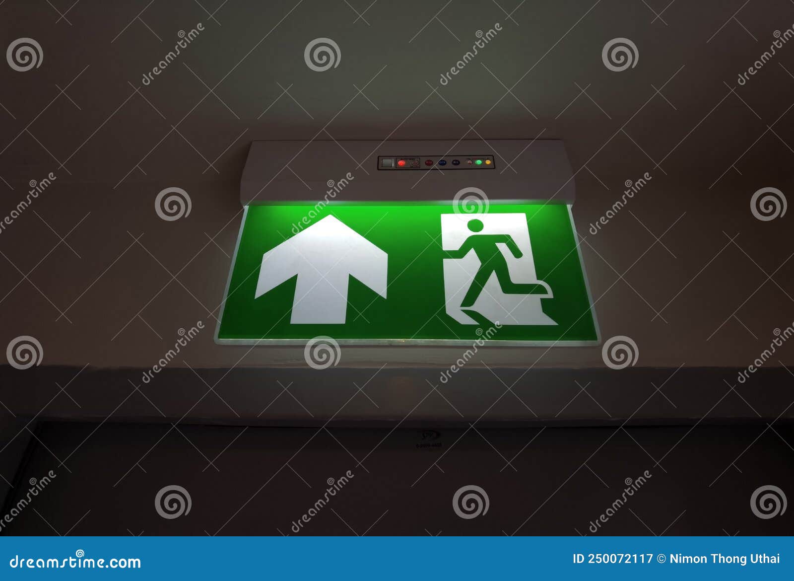 Green emergency exit sign stock image. Image of directional - 250072117