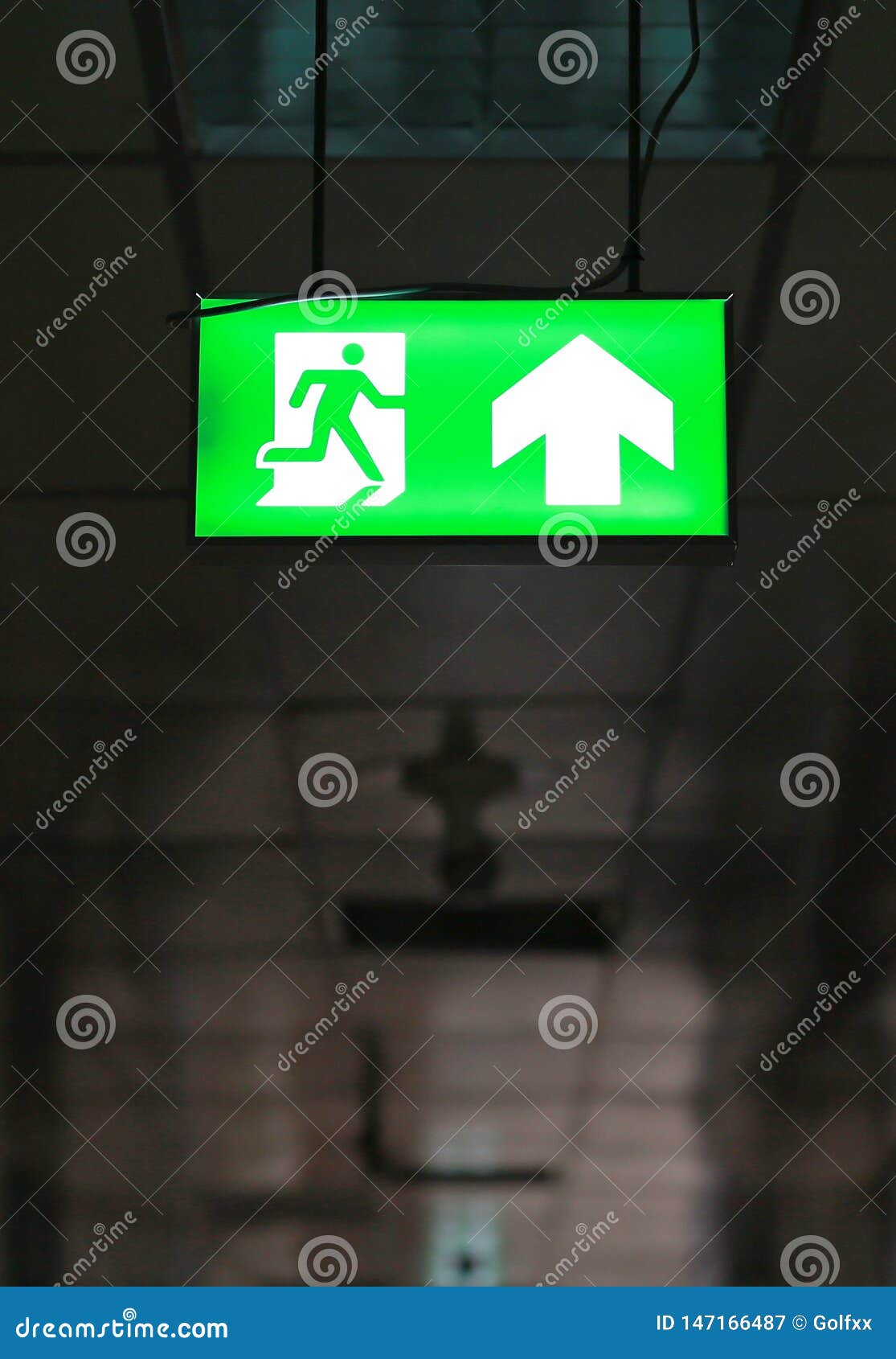 Green Emergency Exit Sign in Public Building Stock Image - Image of ...