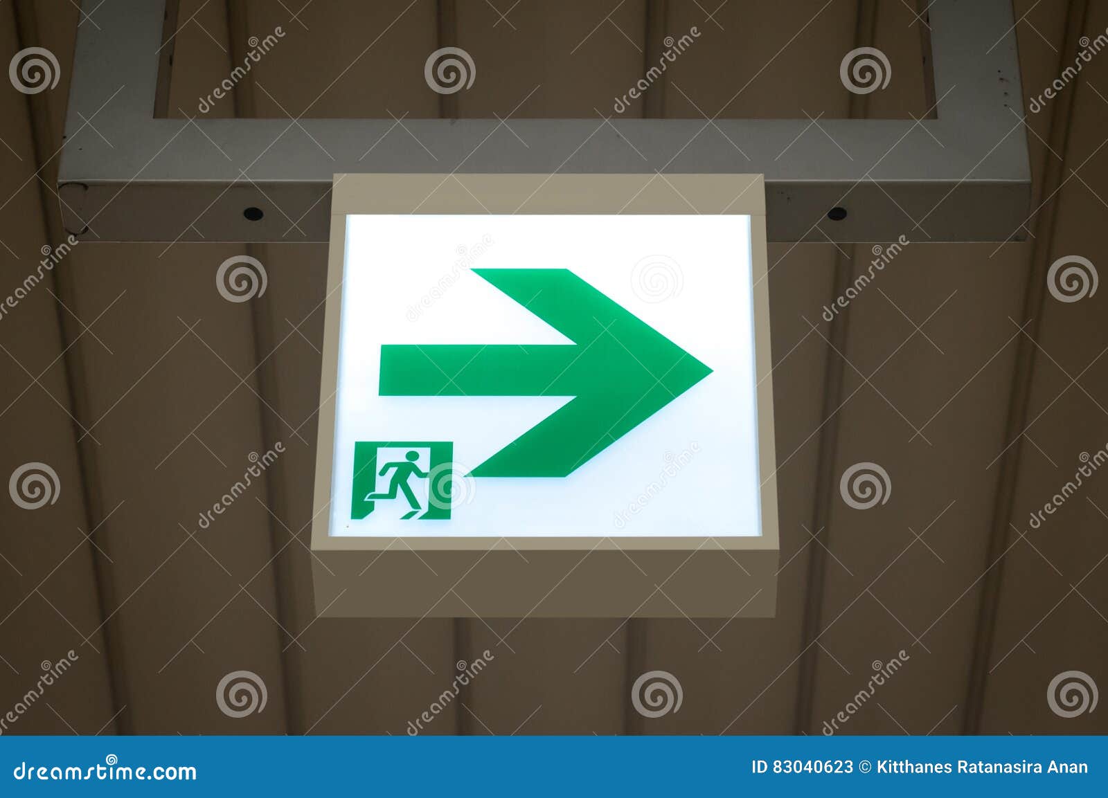 Green Emergency Exit Sign Showing the Way To Escape. Stock Image ...