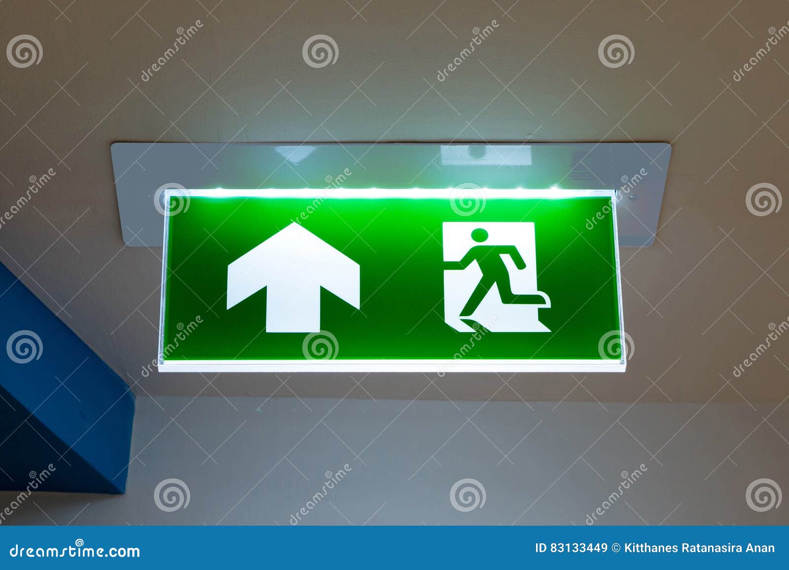 Green Emergency Exit Sign Showing the Way To Escape. Stock Image ...