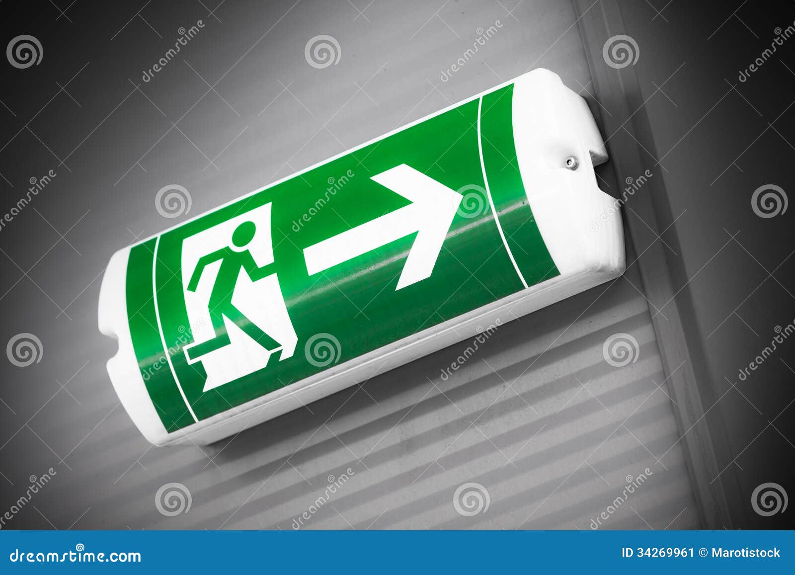 Green Emergency Exit Sign Showing the Way To Escape Stock Image - Image ...