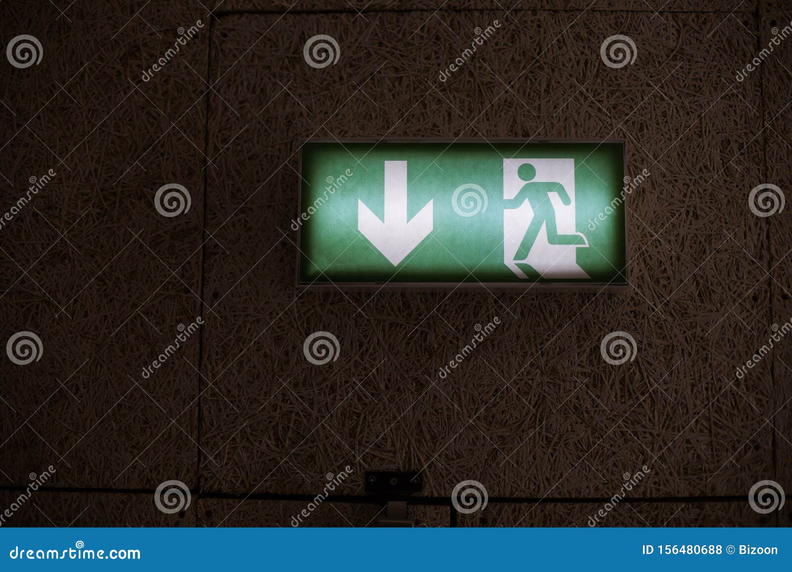 Green Exit Sign Above a Door Stock Photo - Image of security, dark ...