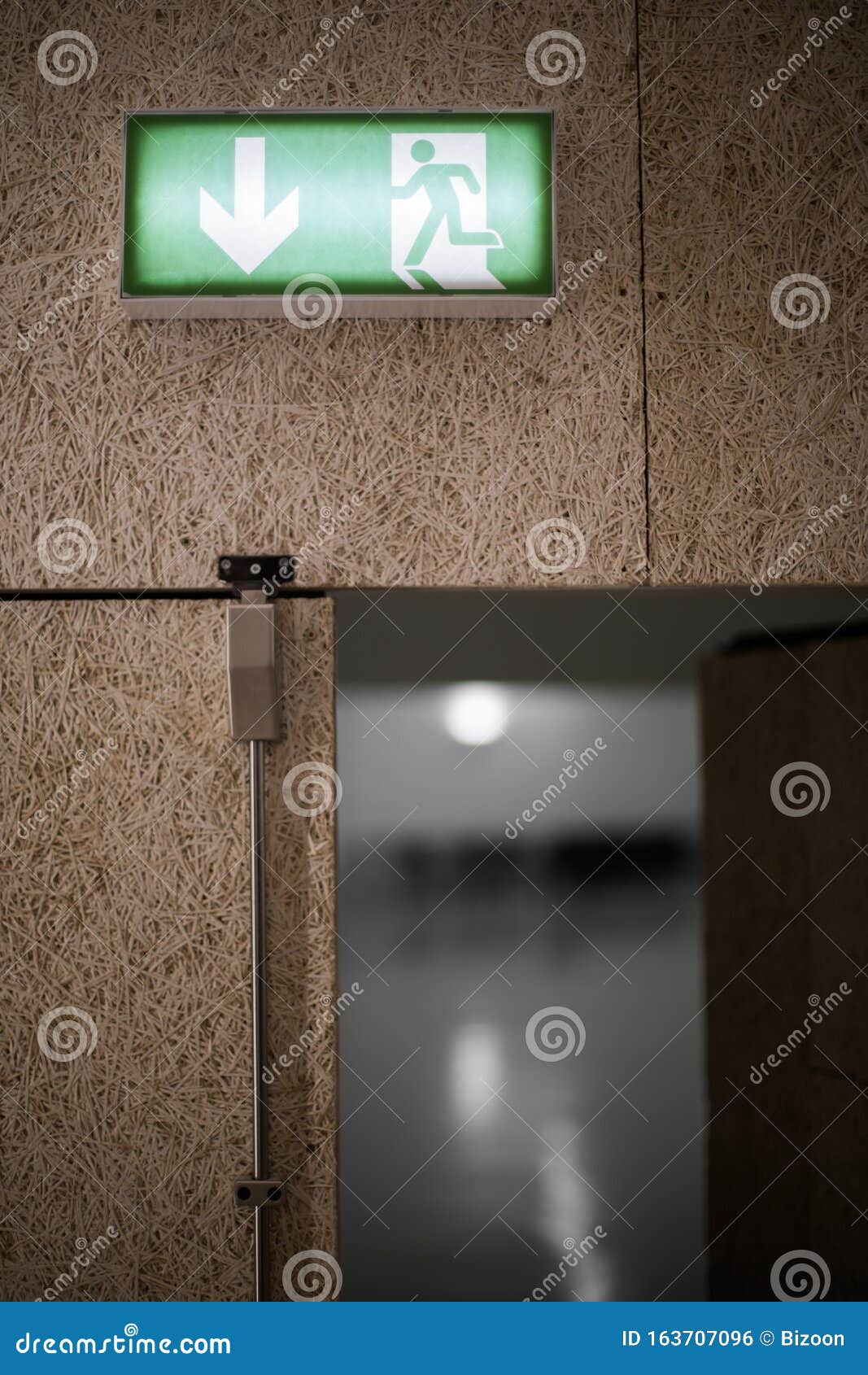 Green Exit Sign Above a Door Stock Photo - Image of warning, doorway ...