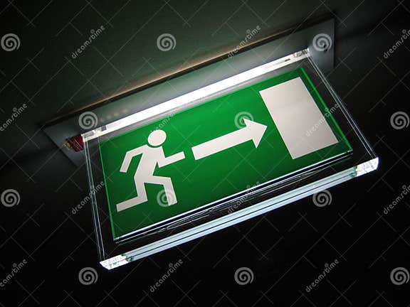 Green Exit Sign on Ceiling stock photo. Image of running - 16490202