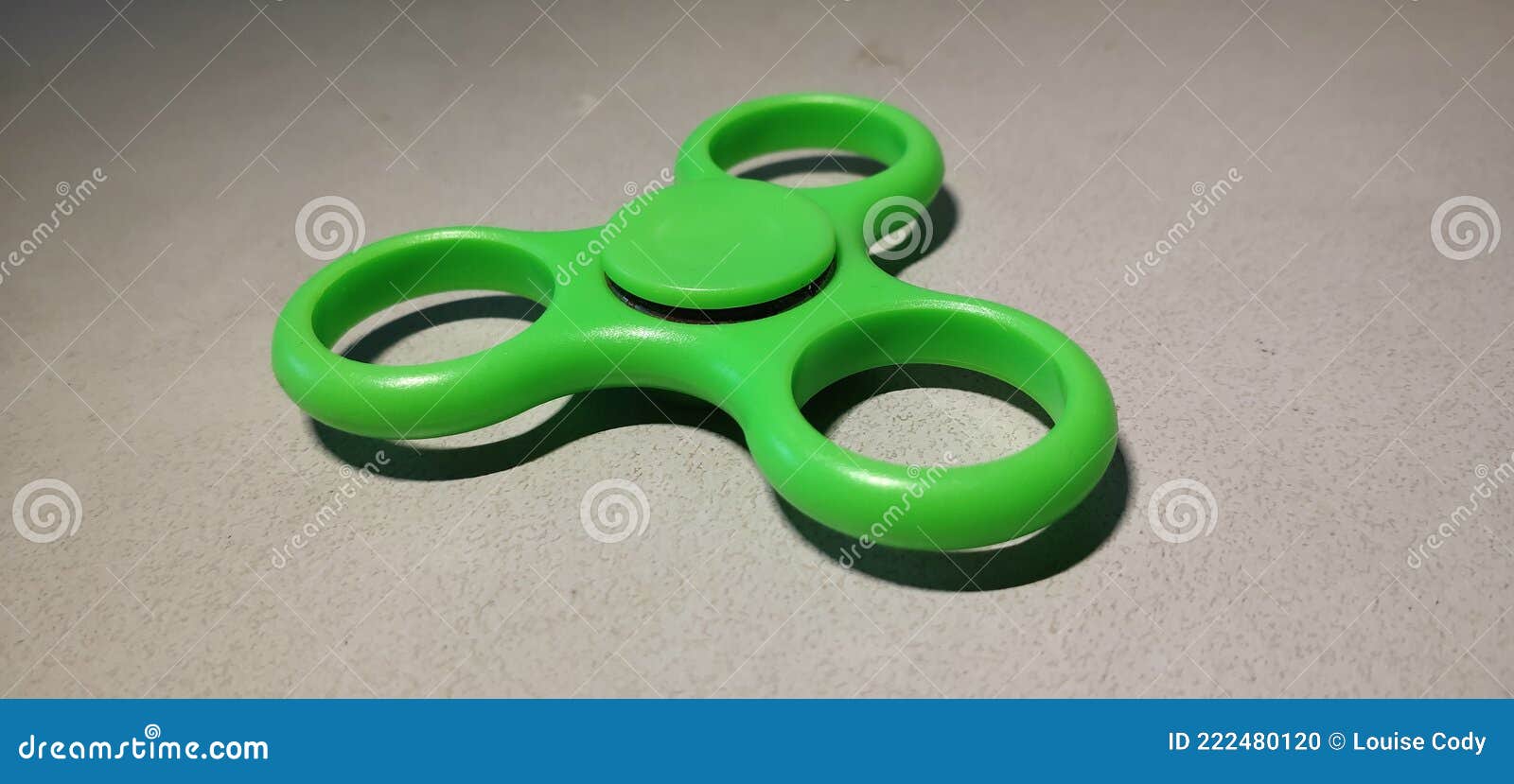 Green Fidget spinner stock photo. Image of memorable - 222480120