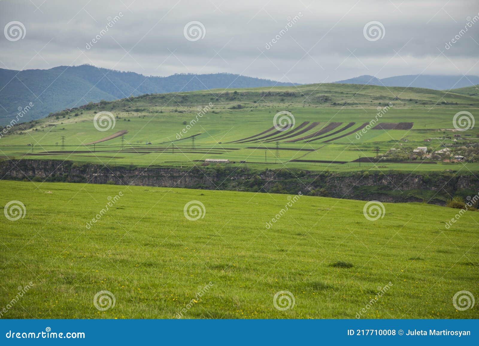 Green field and cliff stock photo. Image of peak, attraction - 217710008
