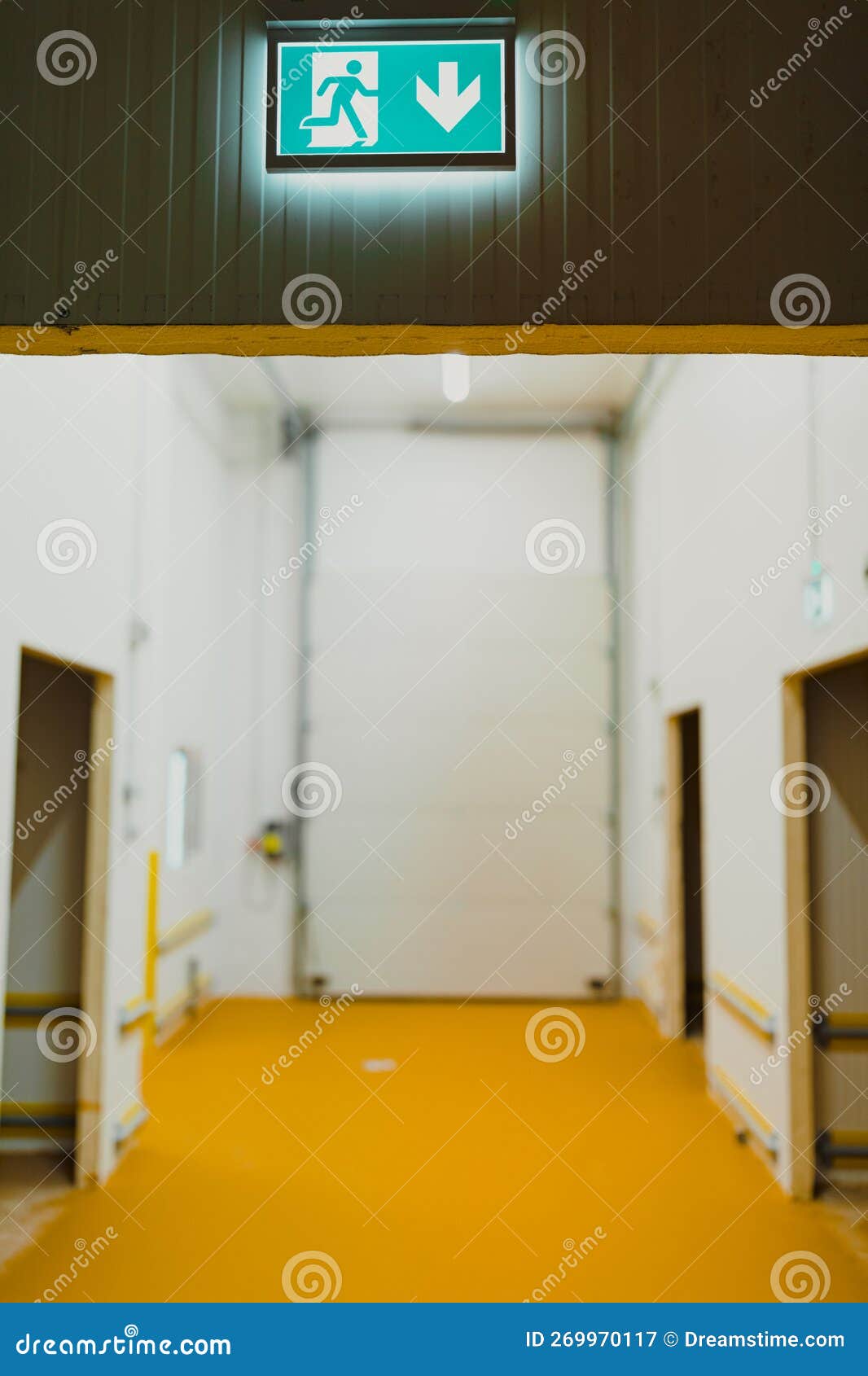 Fire Escape Sign Hang on the Ceiling in the Warehouse Stock Image ...