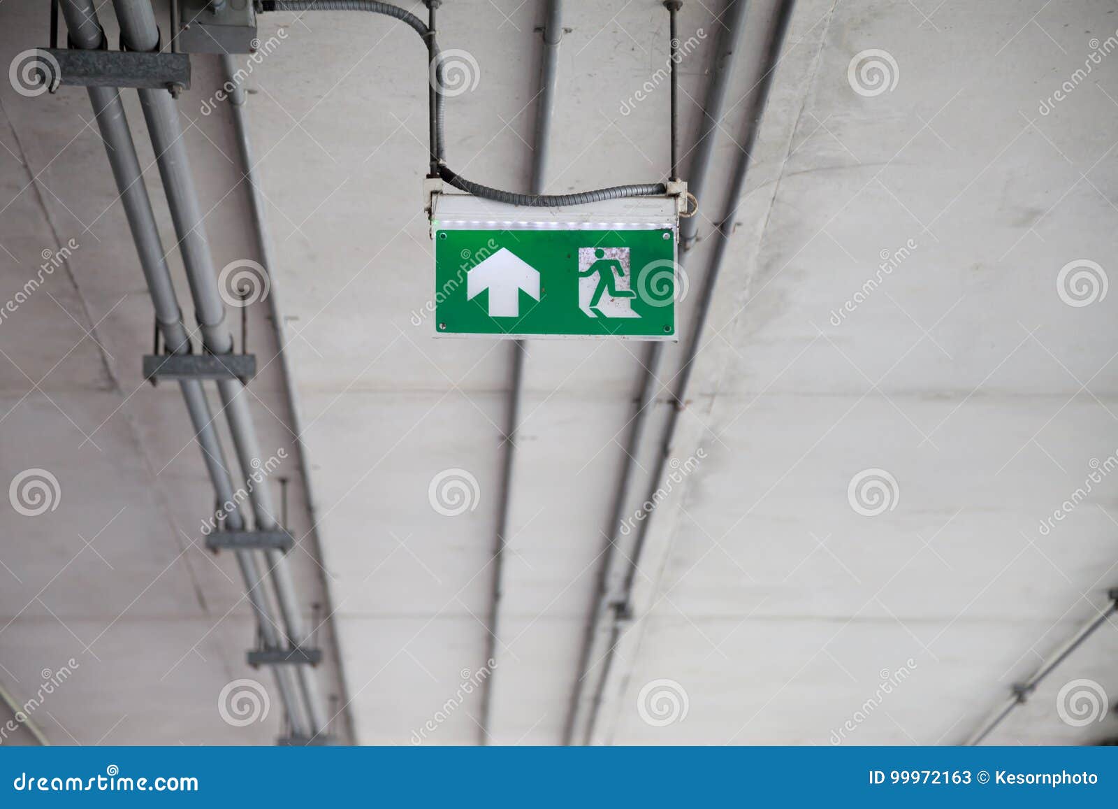 Fire Exit sign in building stock image. Image of night - 99972163