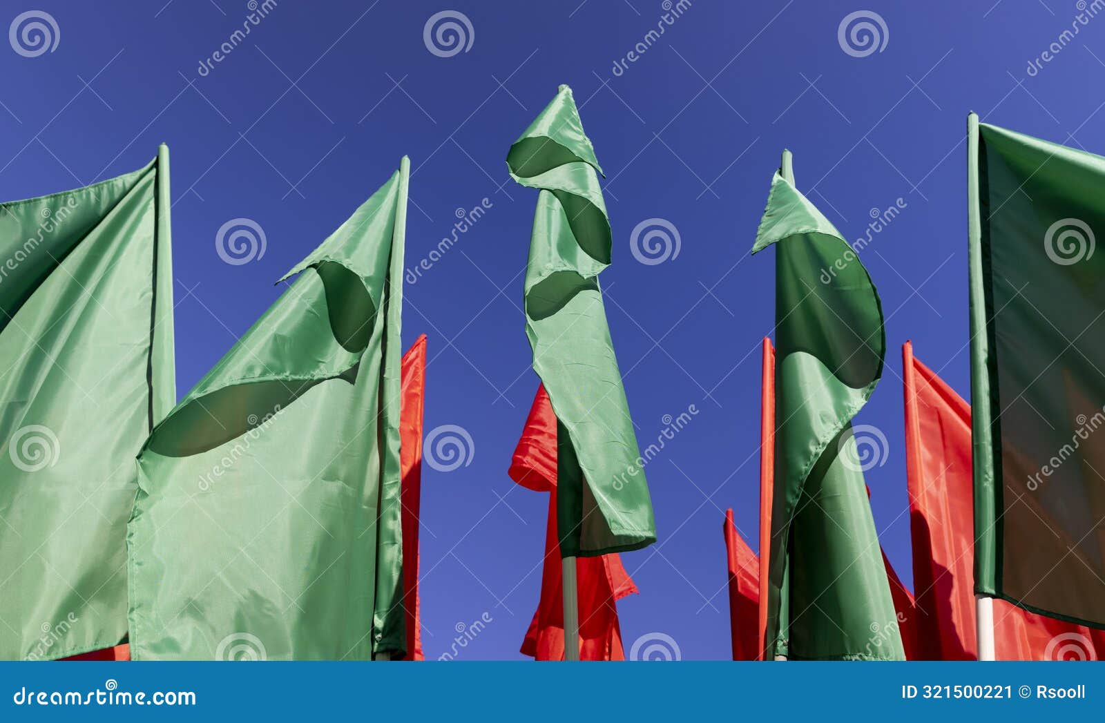 Green Flags Set Up during the Celebration in Windy Weather Stock Image ...