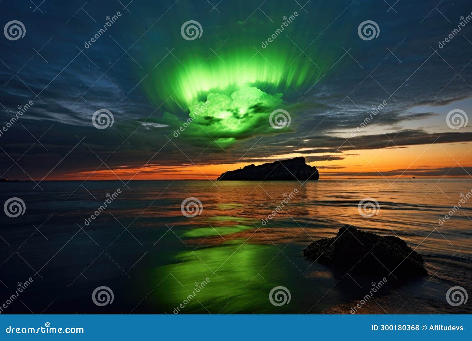 A Green Flash Occurring Just after Sunset Over the Ocean Stock Photo ...