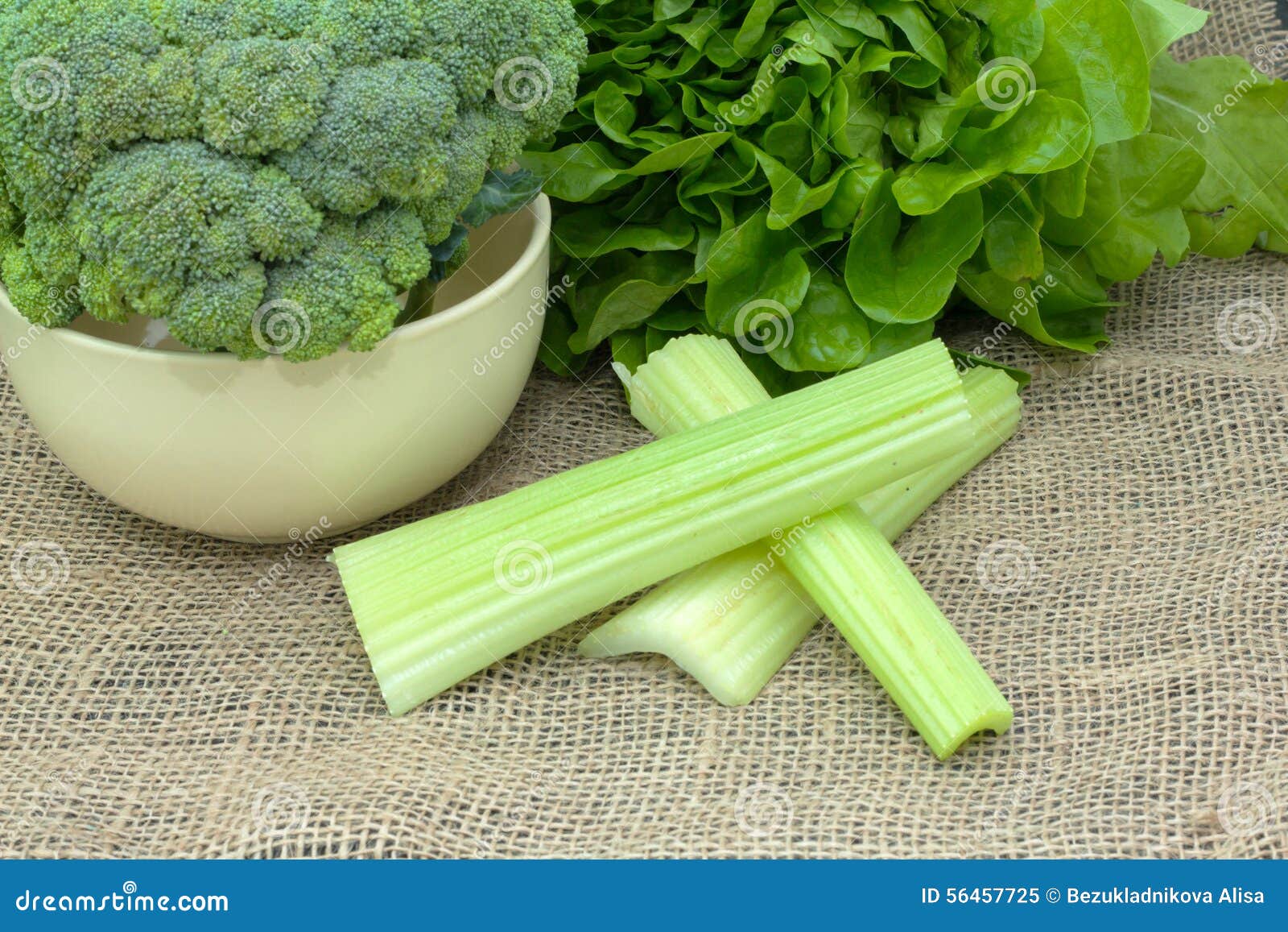 Green Fresh Vegetables. Whole Broccoli in a Bowl with Lettuce and ...