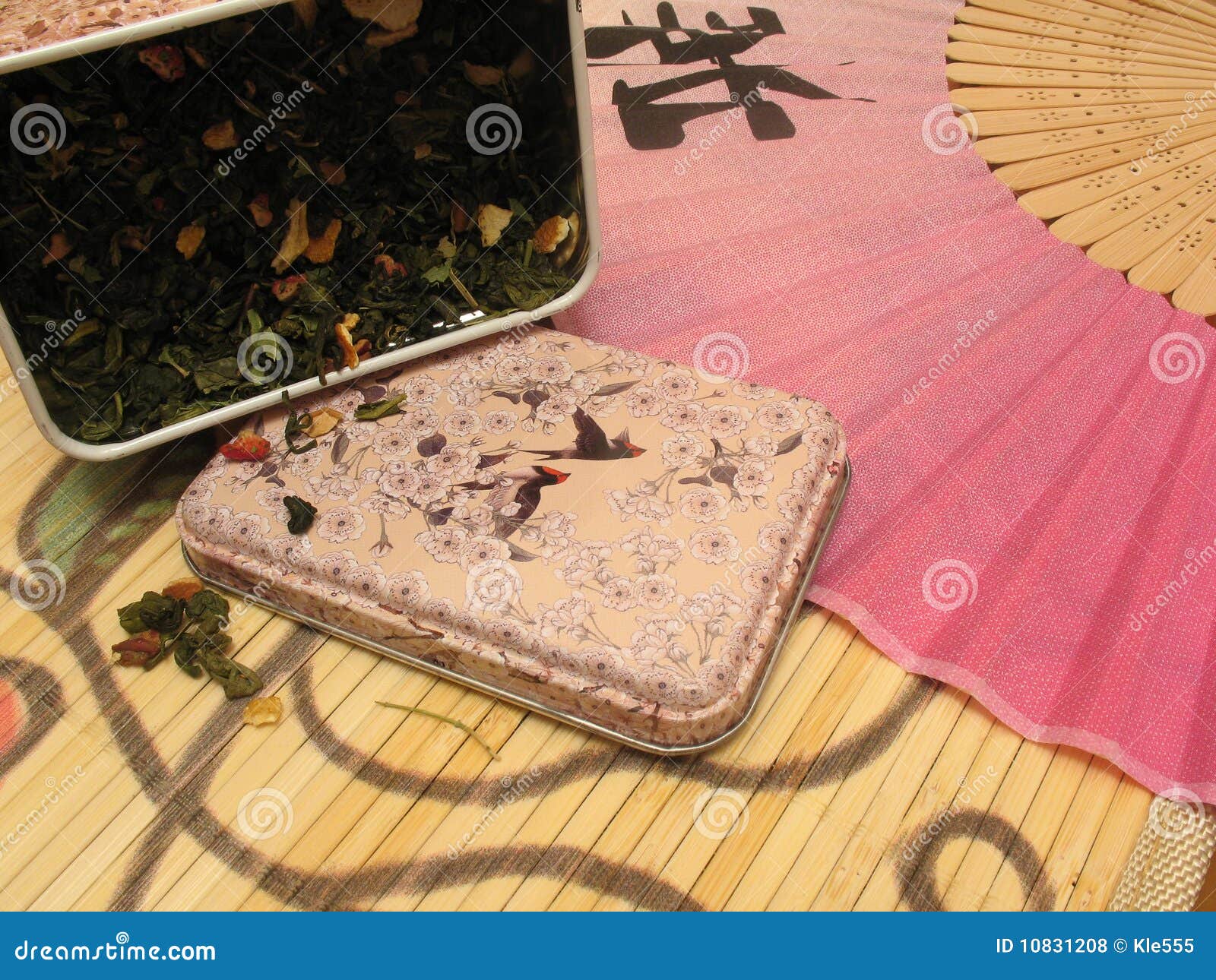 Green Fruit Tea in Tin and Chinese Fan Stock Photo - Image of chinese ...