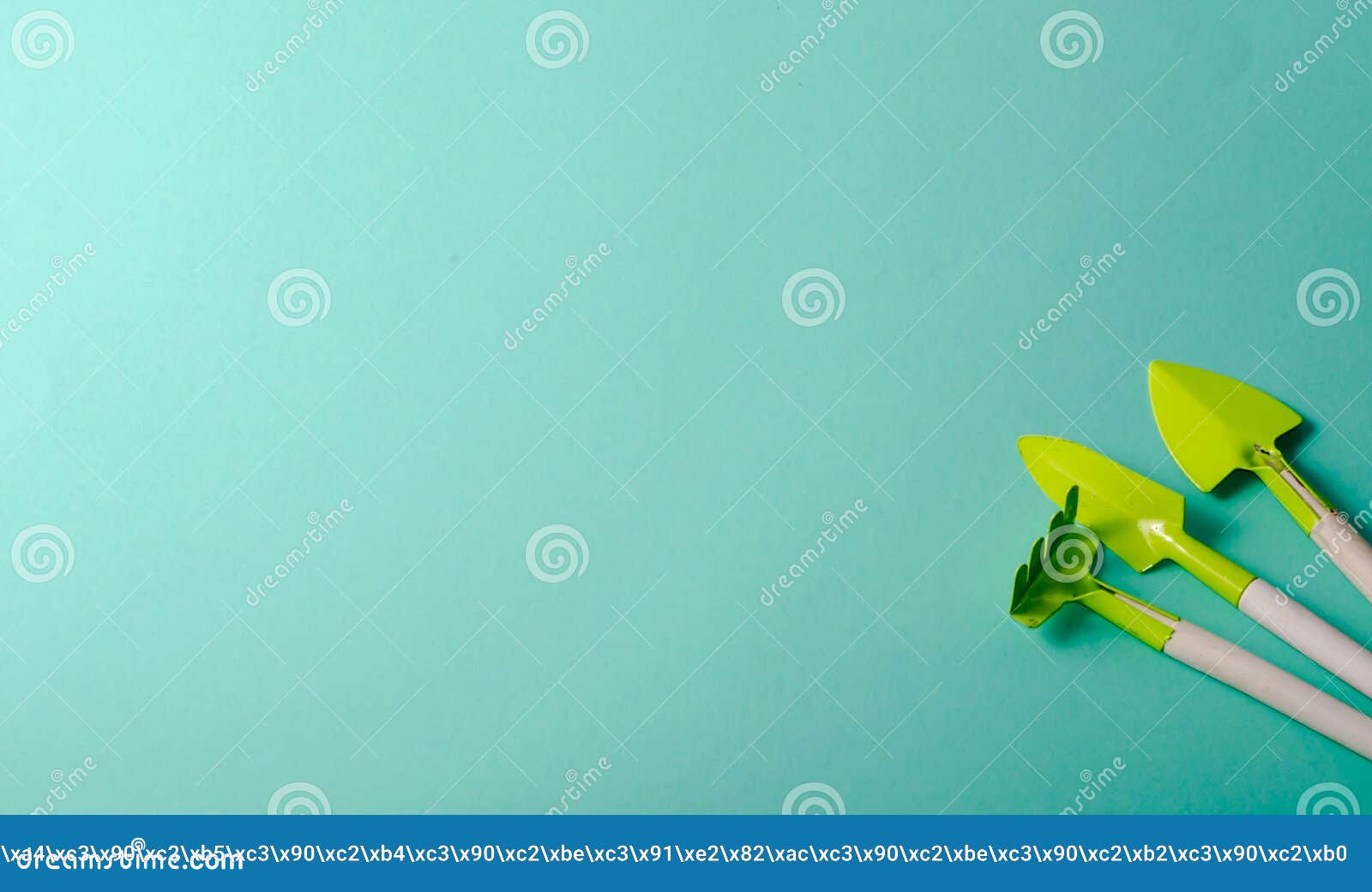 Green Garden Tools on Light Blue Background Stock Photo - Image of ...