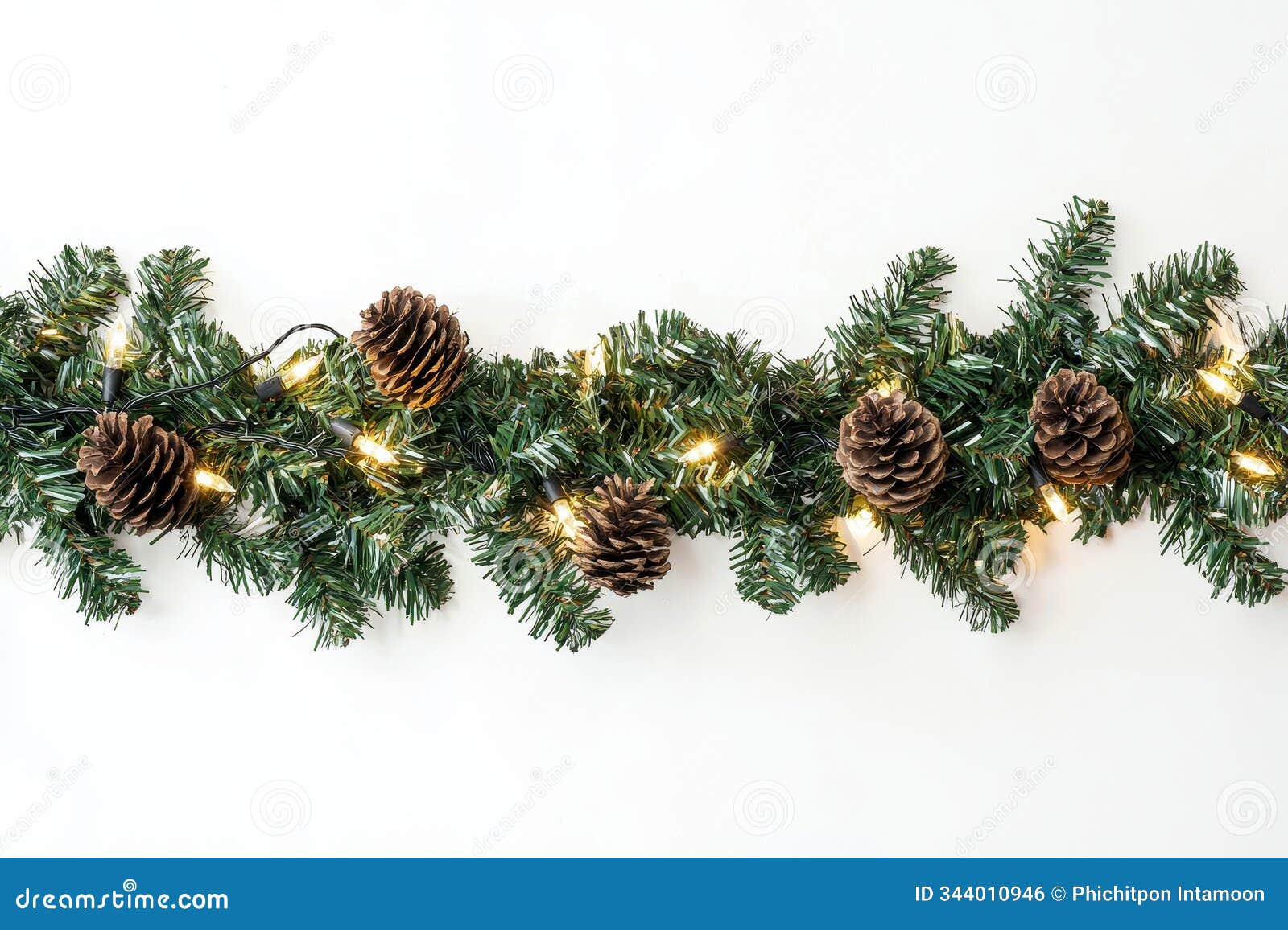Green Garland with Lights and Pine Cones on Isolated White Background ...