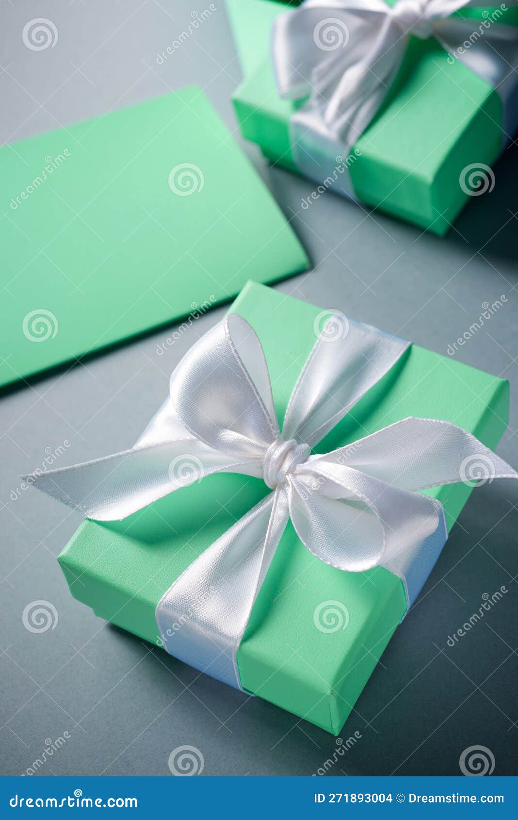 Green Gift Boxes with a White Ribbon Stock Photo - Image of jewelry ...