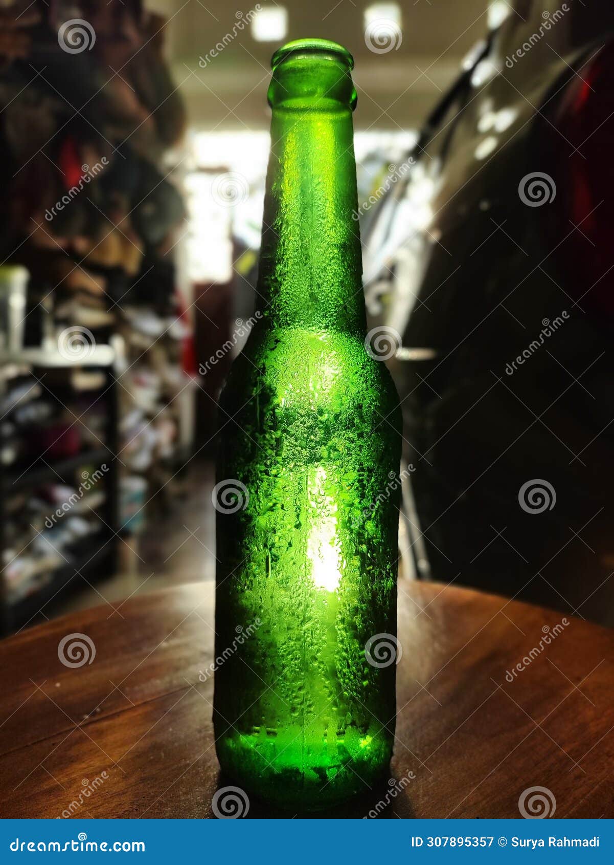 Green Glass Bottle of Cold Water in the Morning. Stock Image - Image of ...