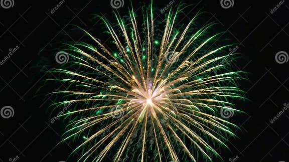 Green and Gold Fireworks Exploding in Night Sky Stock Photo - Image of ...