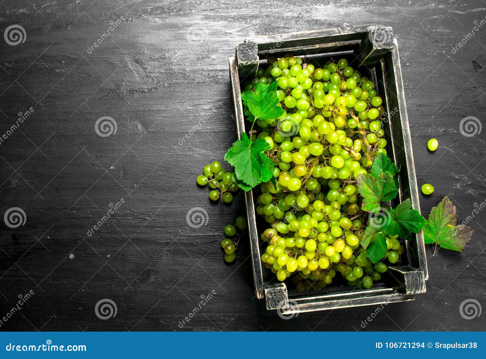 Green grapes in a box. stock photo. Image of delicious - 106721294