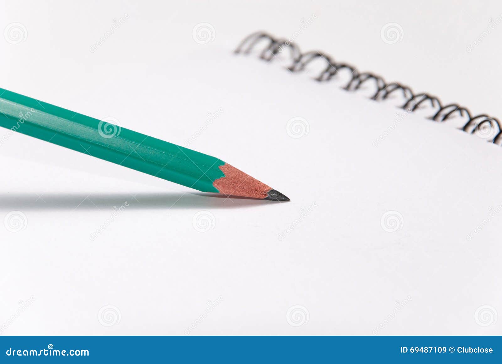 Green Graphite Sharp Pencil Writing on White Paper, Notebook Stock ...