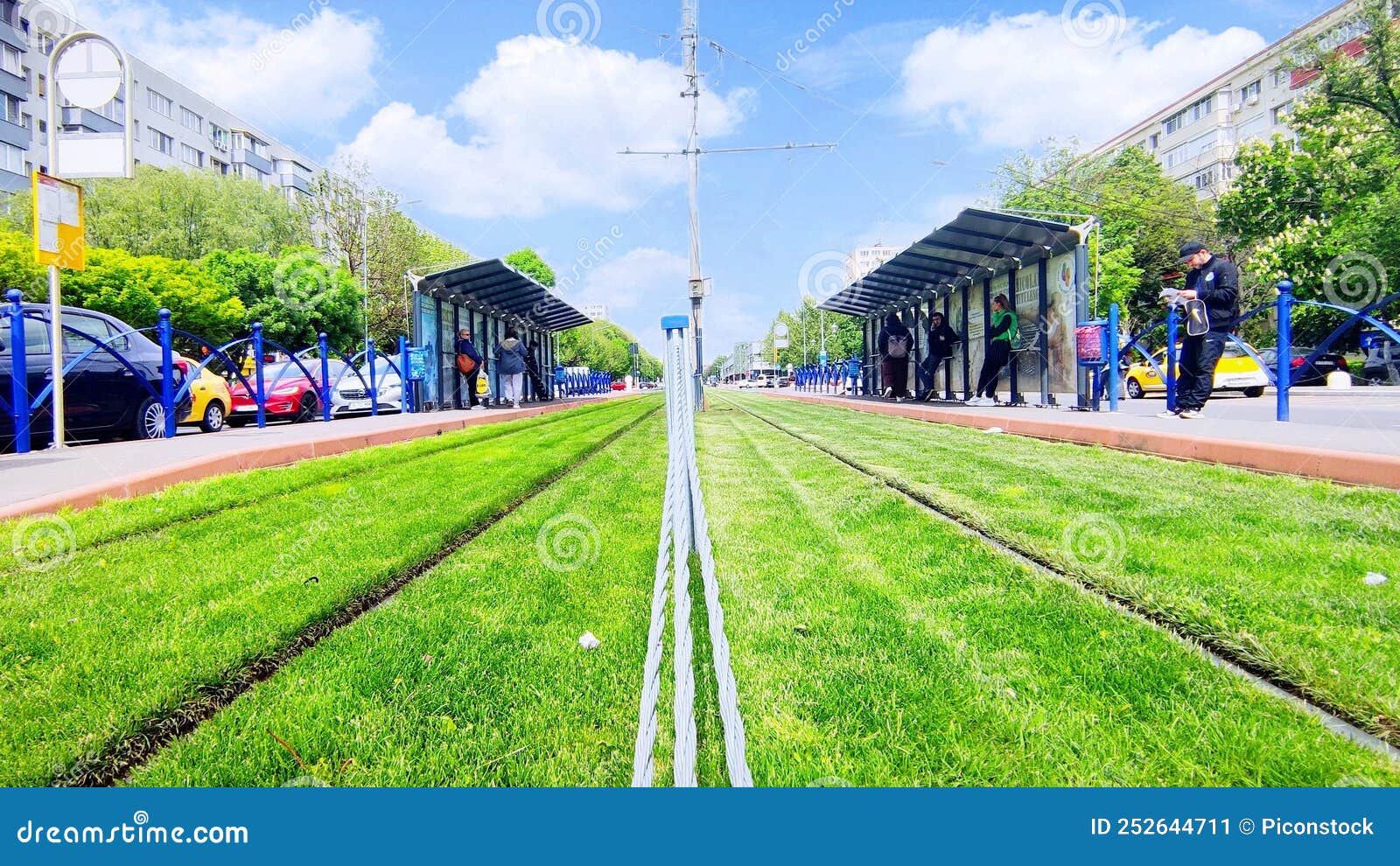 Green grass tram station editorial photo. Image of covered - 252644711