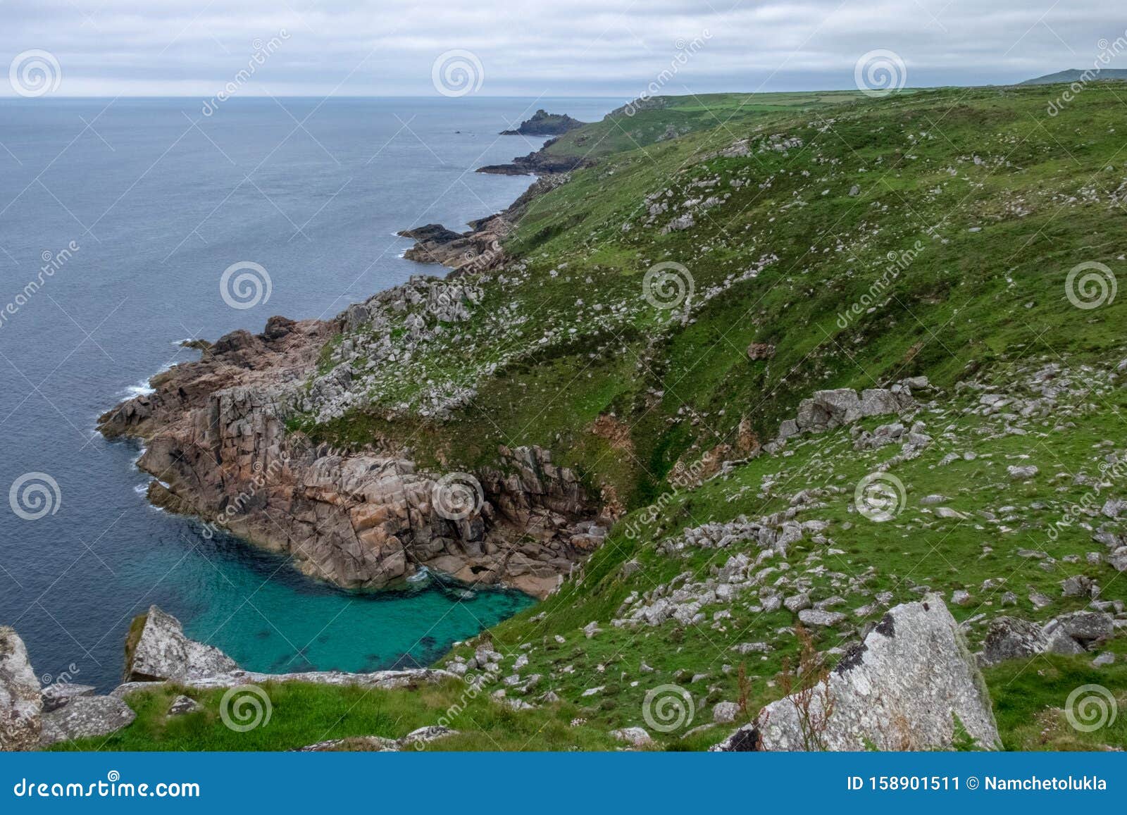 Green grassy cliffs stock image. Image of outdoor, blue - 158901511